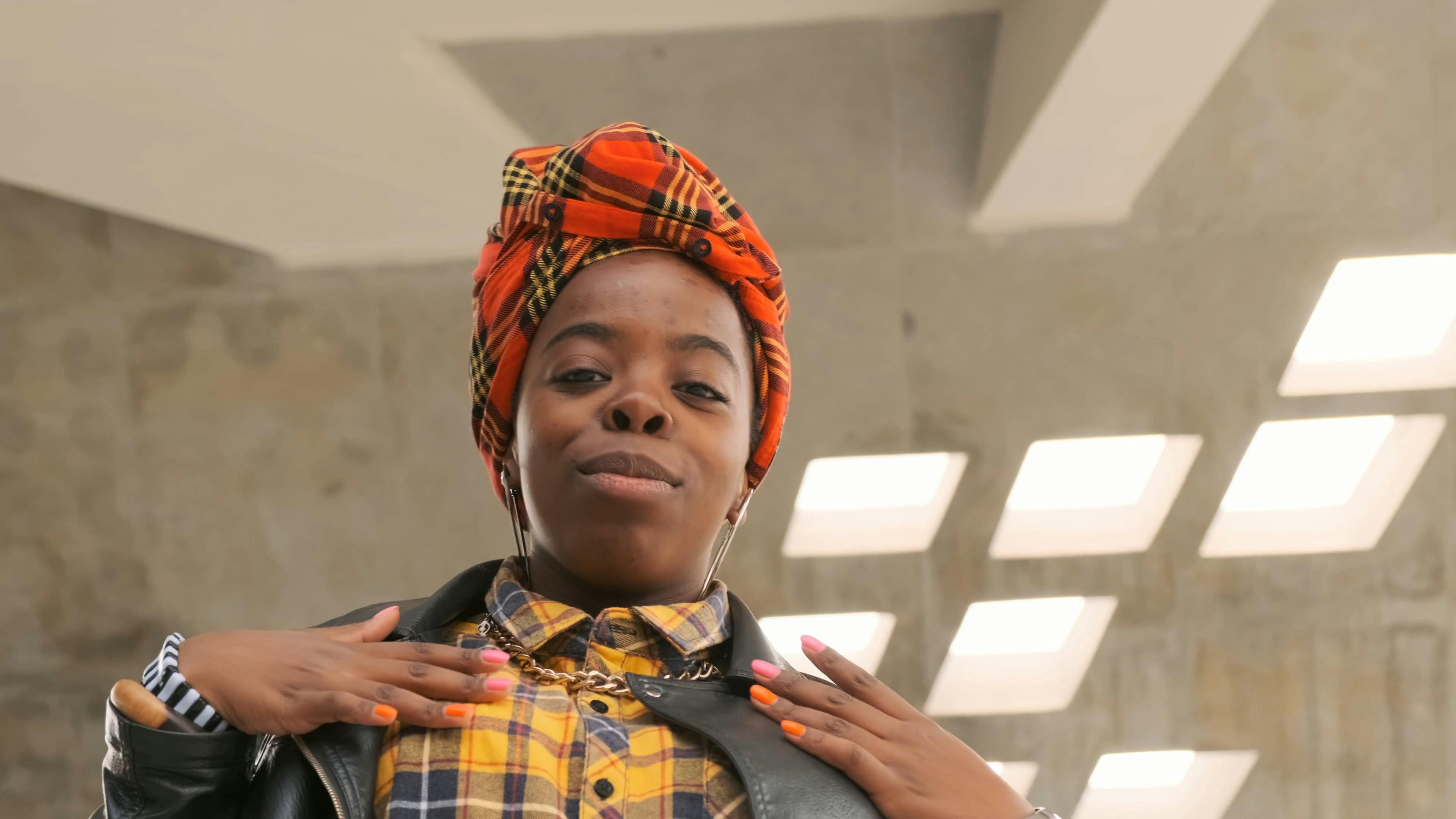 A Woman Dancing Freely Outdoors On A Concrete Pavement Free Stock Video ...