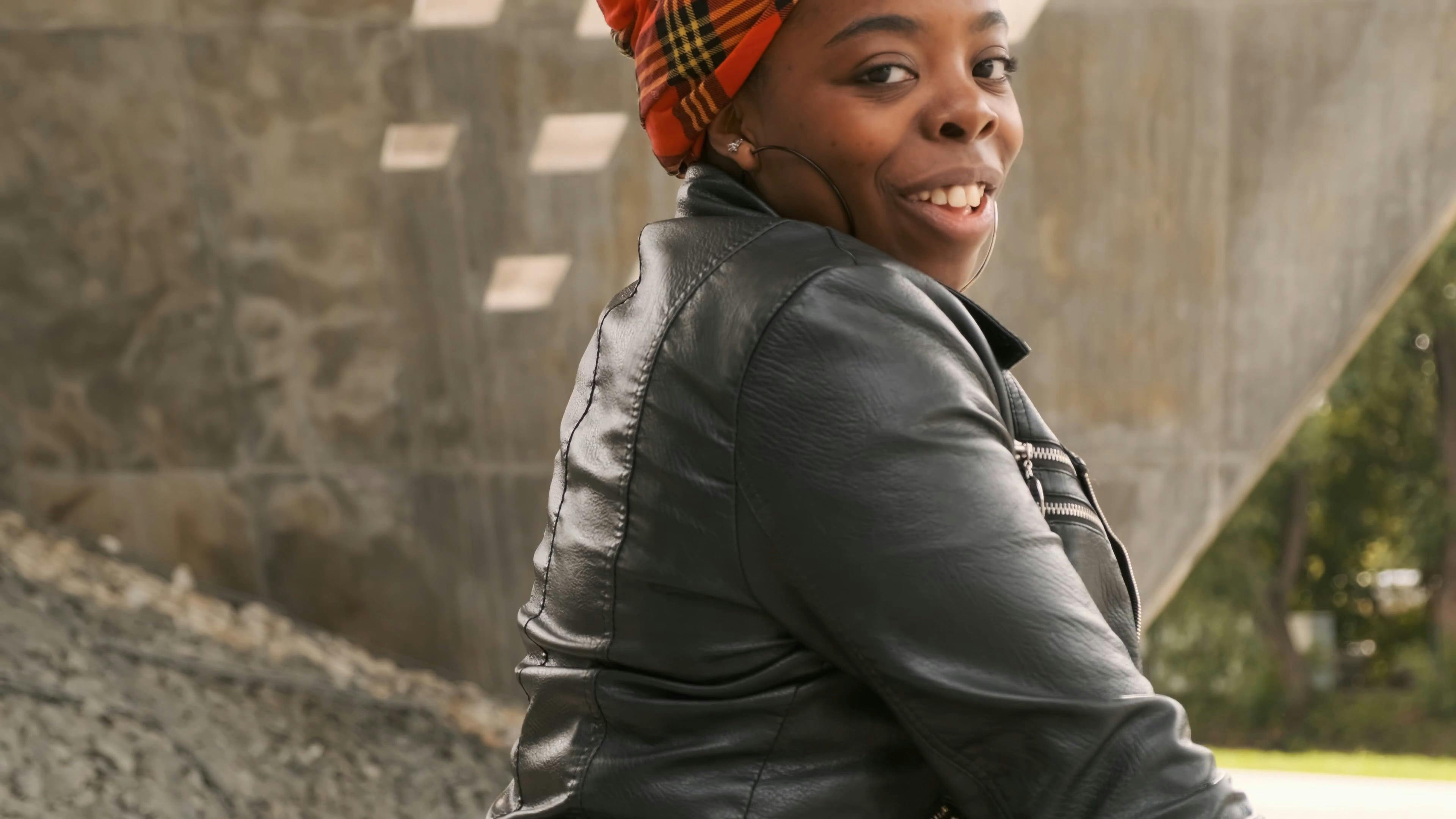 A Woman Dancing Freely Outdoors On A Concrete Pavement Free Stock Video ...