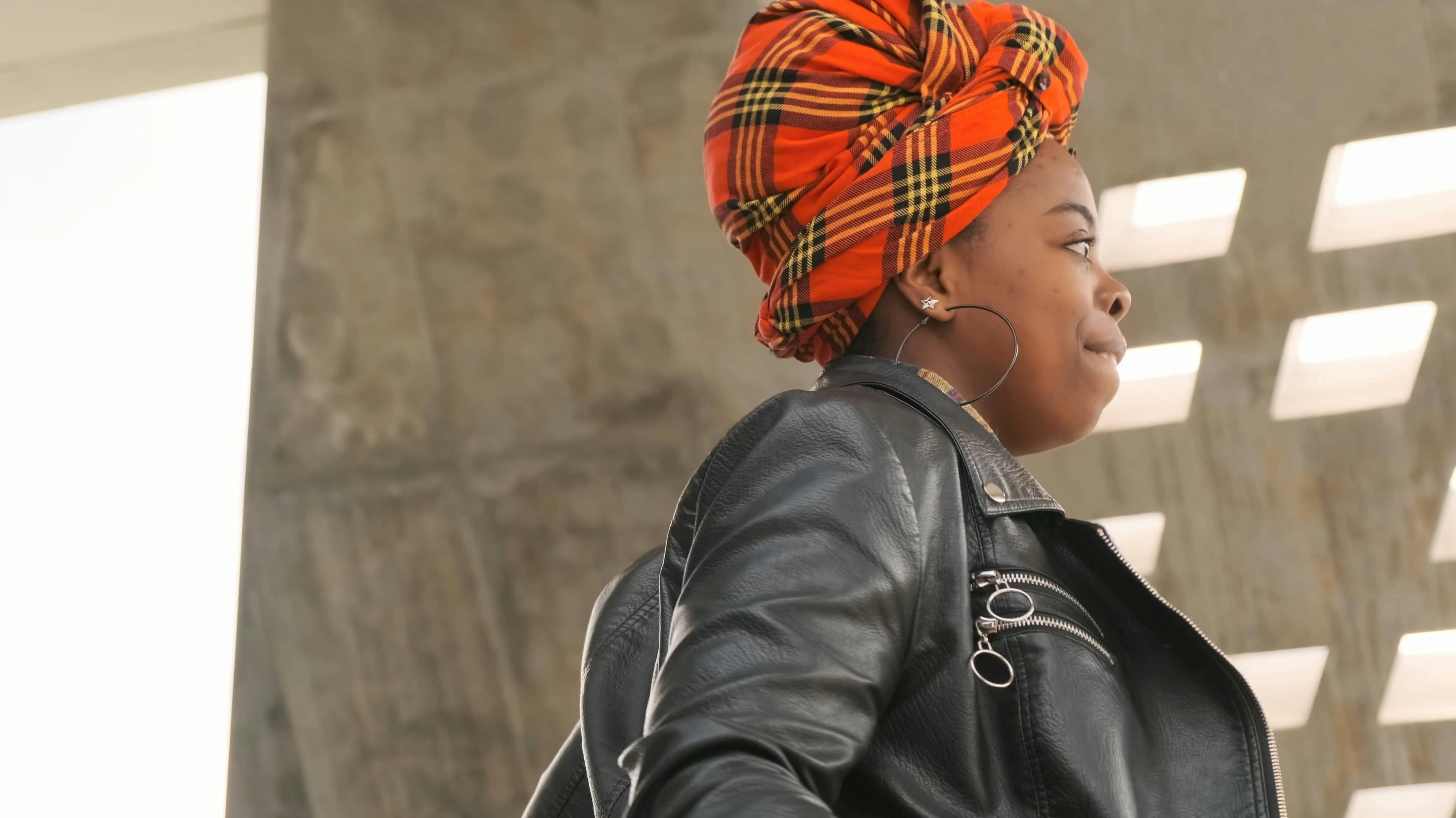 A Woman Dancing Freely Outdoors On A Concrete Pavement Free Stock Video ...