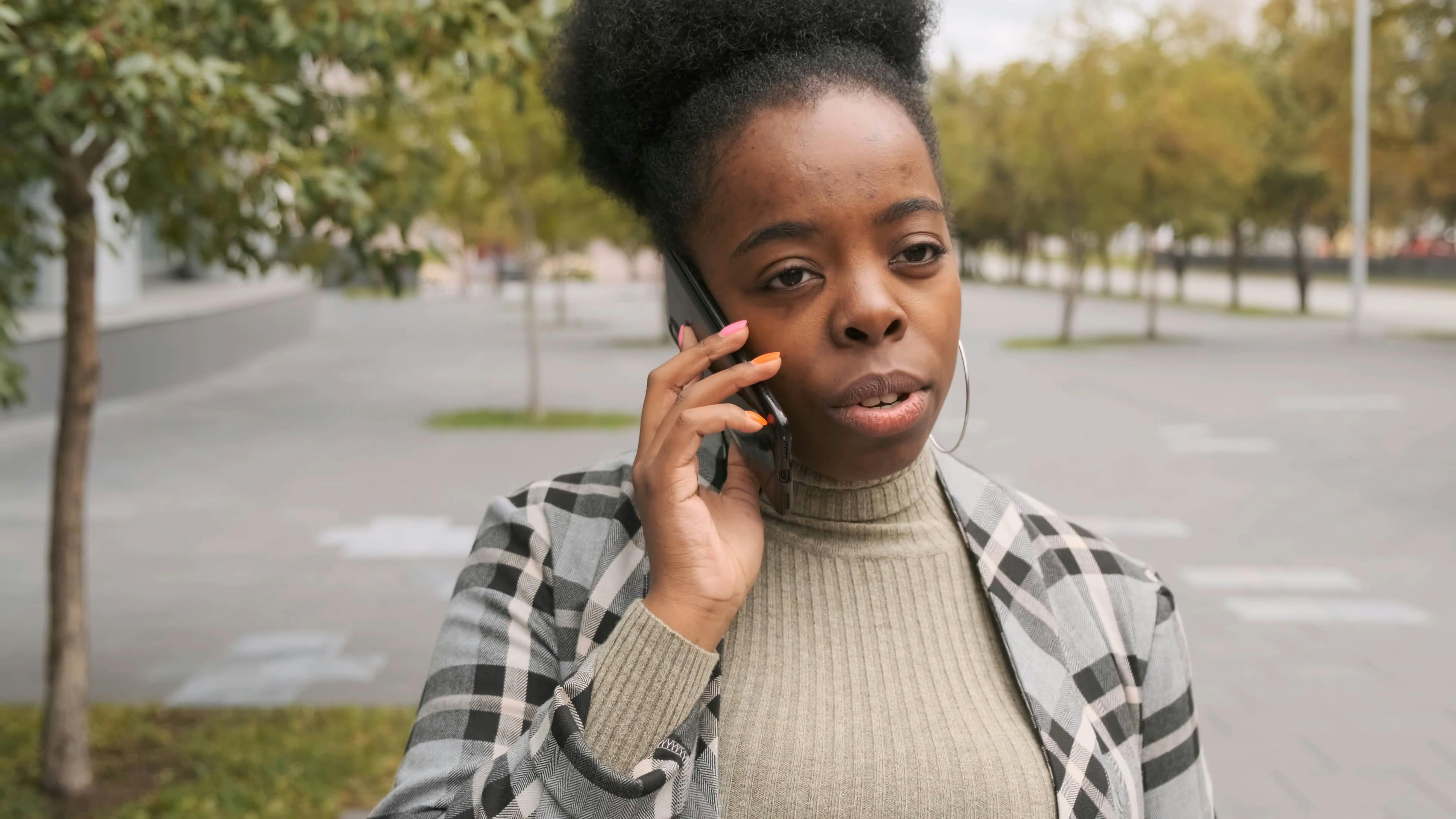 A Woman Dancing Freely Outdoors On A Concrete Pavement Free Stock Video ...