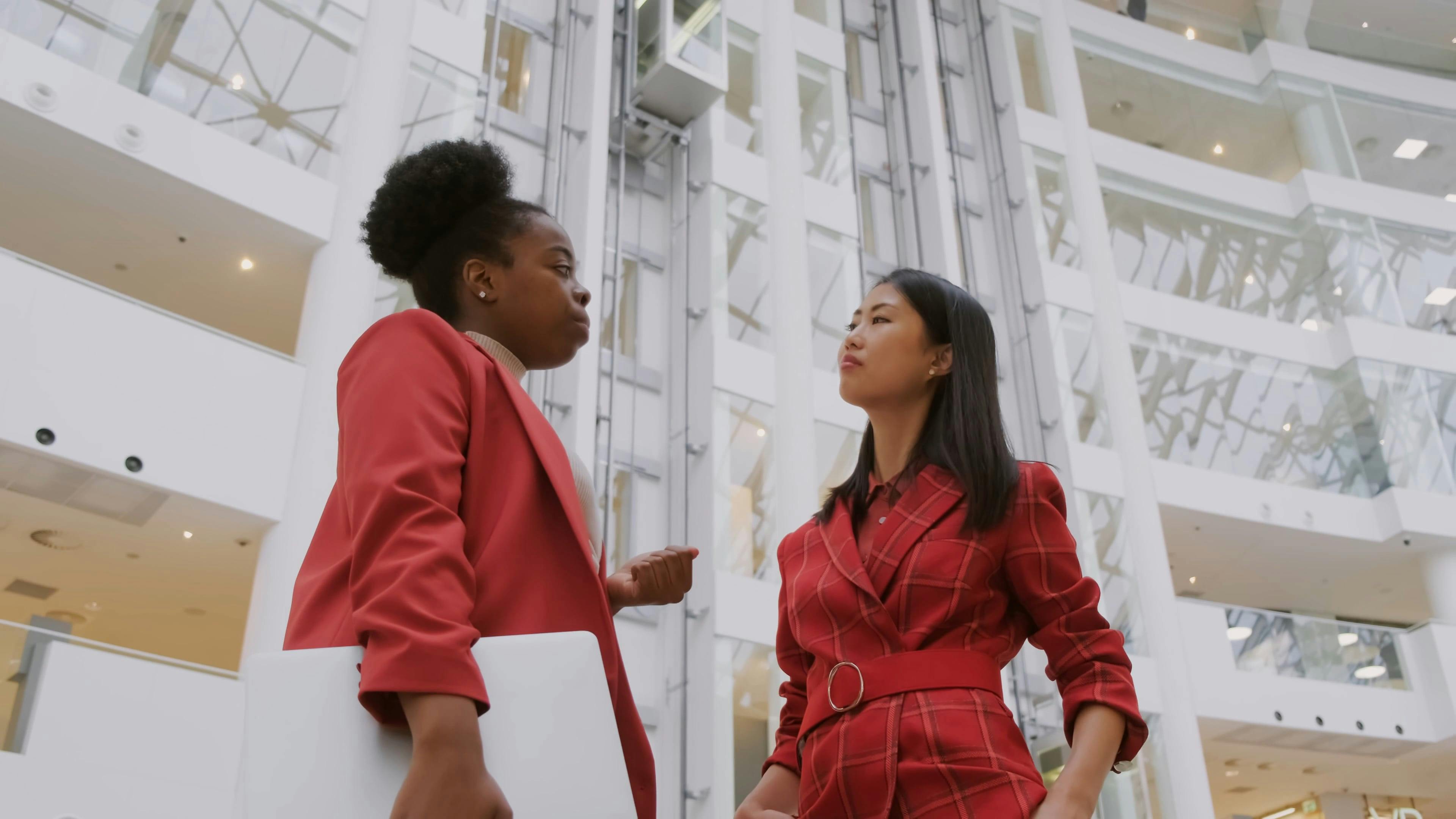 A Woman Nodding Her Head In Agreement Of Another Woman Explanation ...