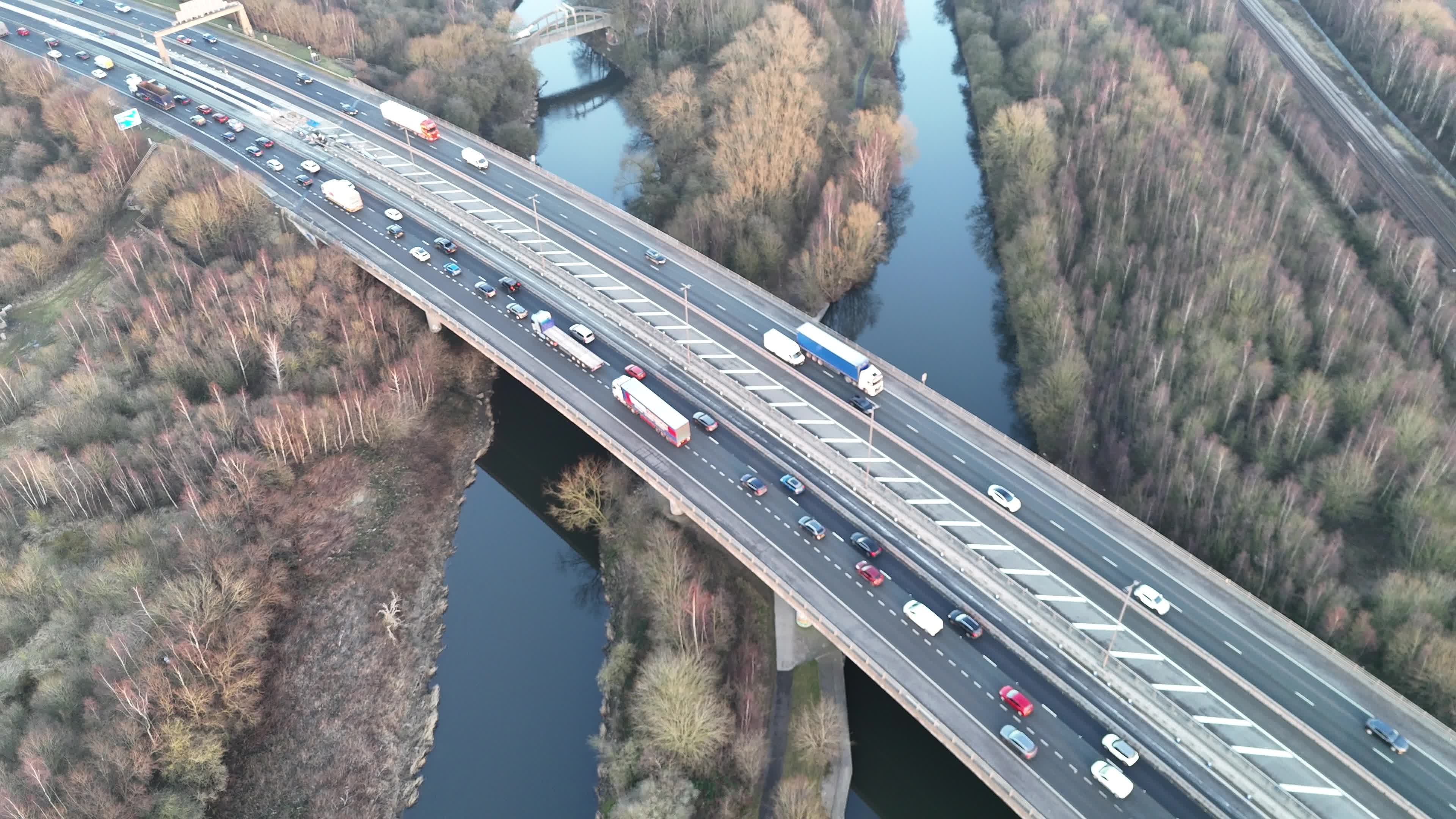 Aerial View of Busy Highway Bridge Over River Free Stock Video Footage ...