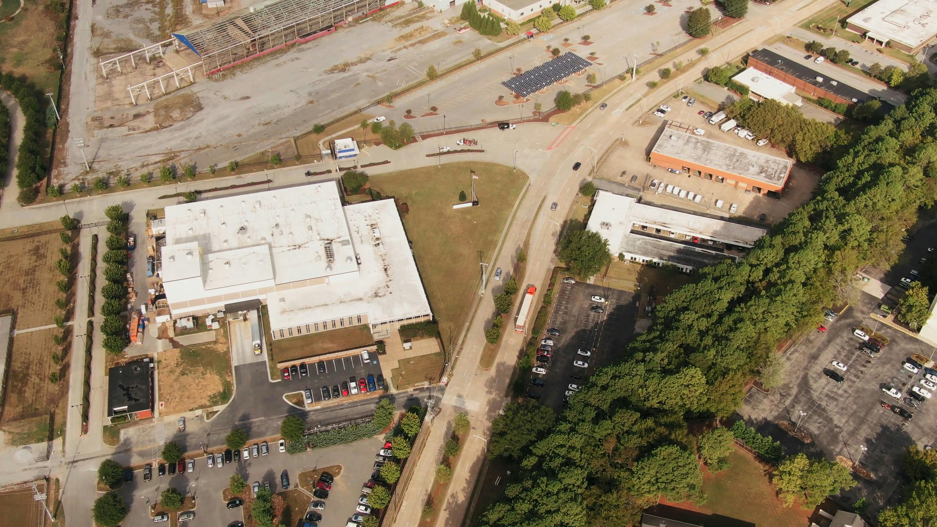 Aerial Footage Of Warehouses Construction In A Business District · Free ...