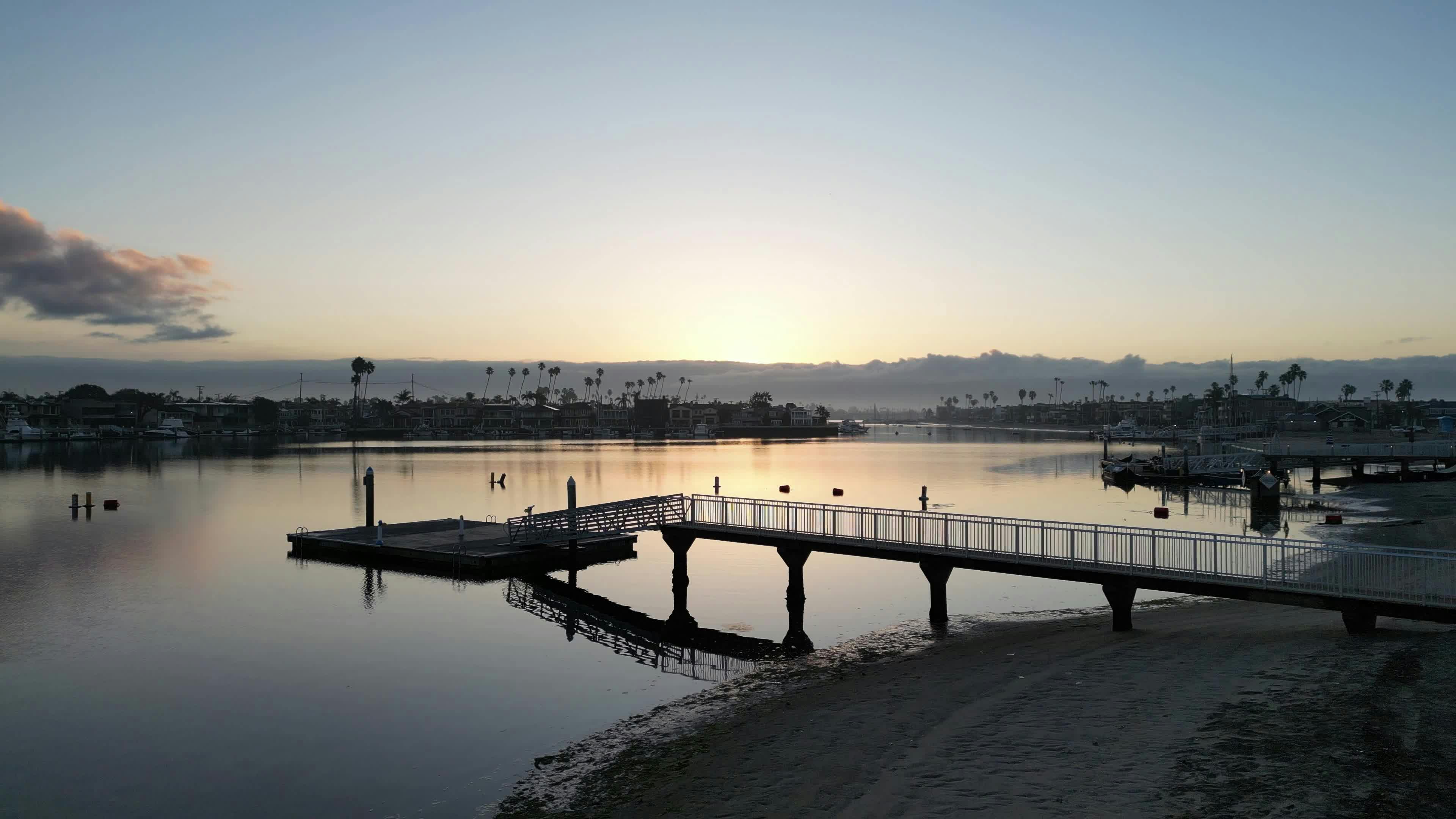 Stunning Aerial Sunrise Over Calm Coastal Peninsula Free Stock Video ...