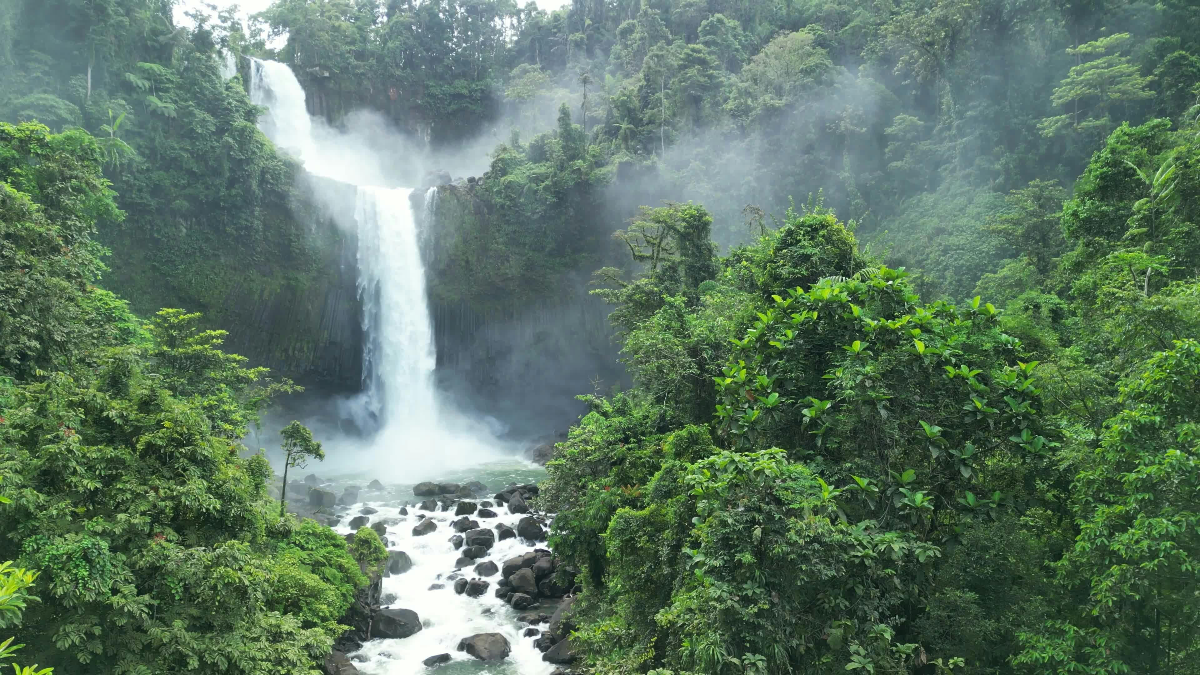 Stunning Aerial View of Tropical Waterfall Cascade Free Stock Video ...