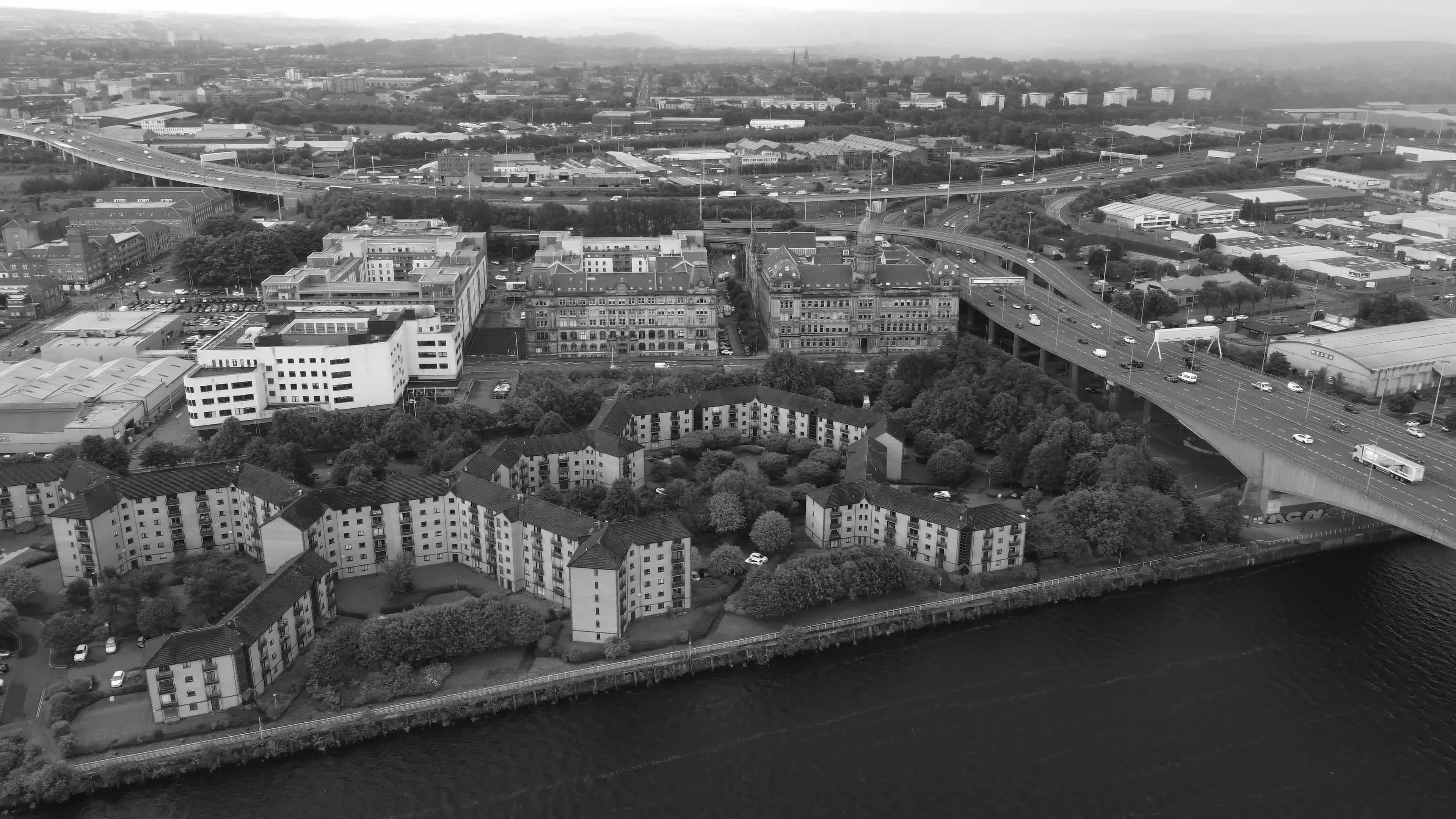 Aerial View of Urban Riverfront Buildings Free Stock Video Footage ...
