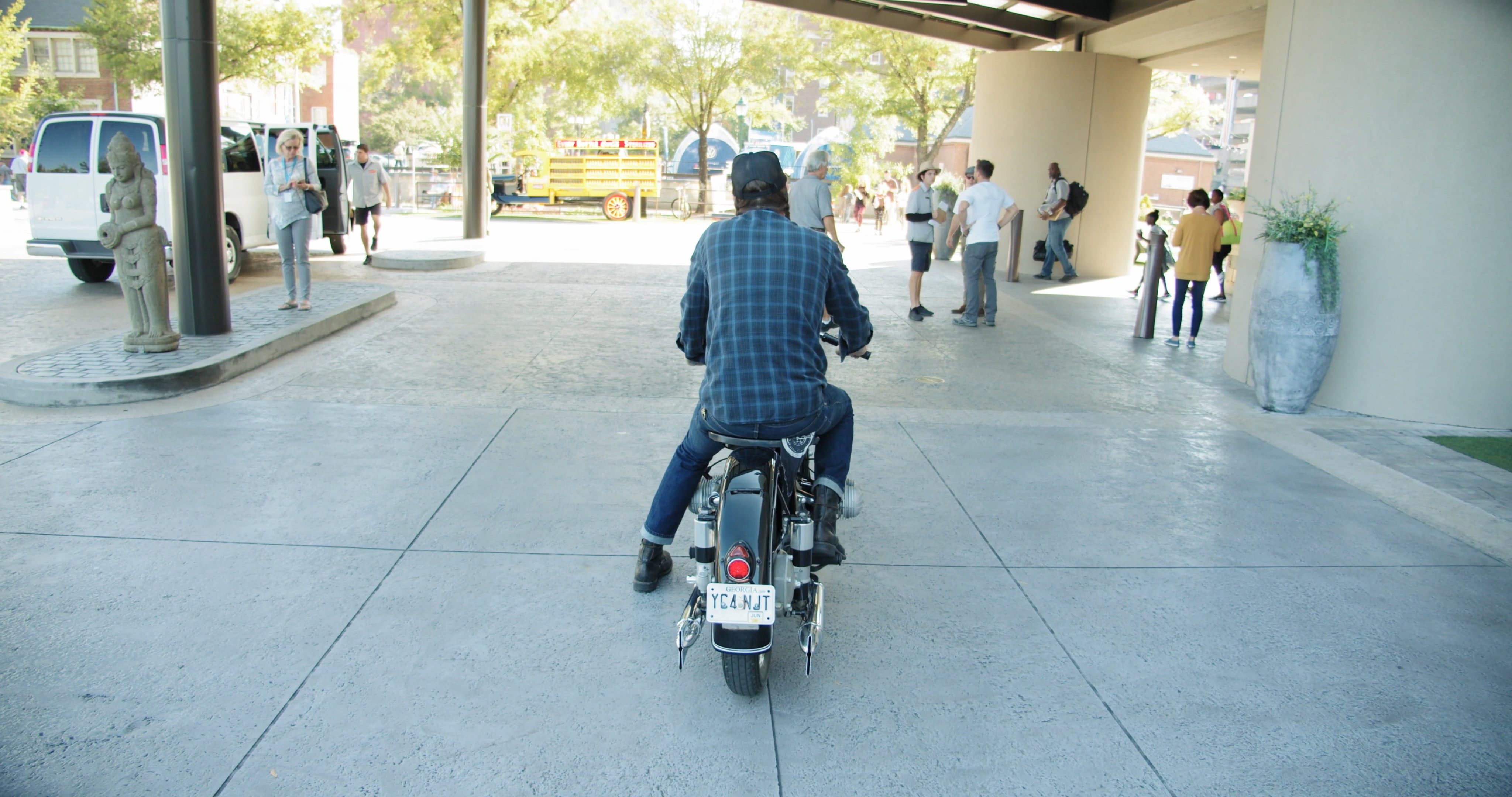 A Man On His Motor Bike Waiting On A Driveway · Free Stock Video