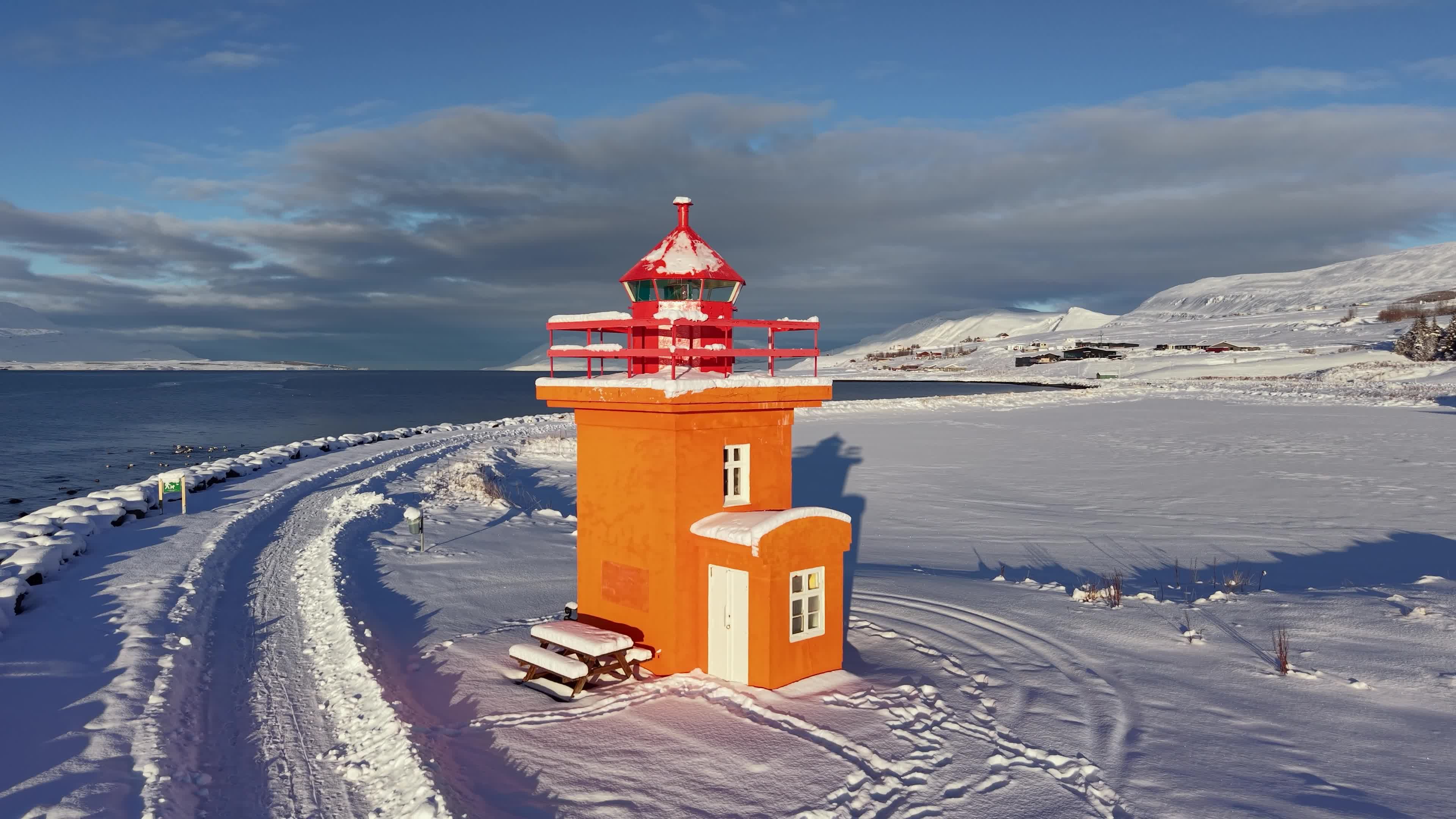 Bright Orange Lighthouse in Snowy Landscape Free Stock Video Footage ...