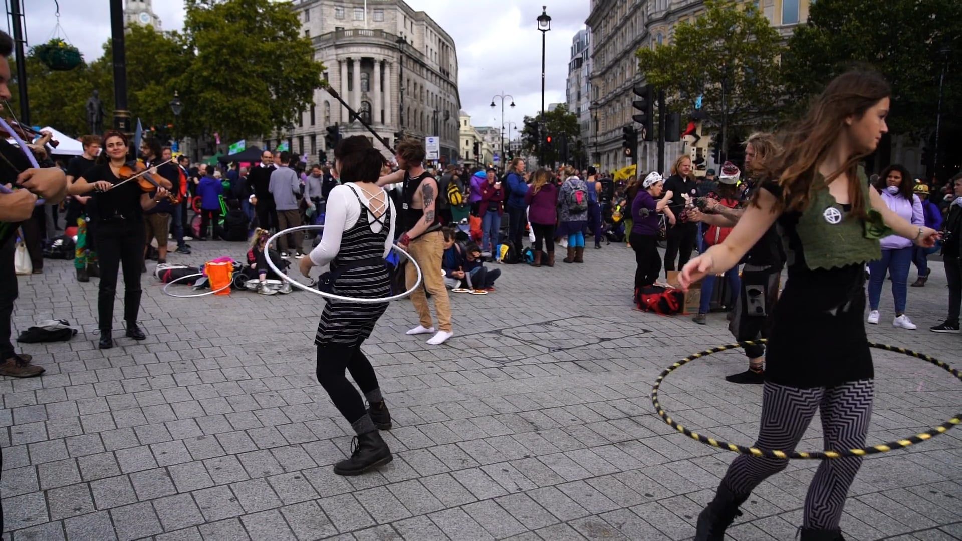 A Group Of Street Performers Performing On A Public Place · Free Stock ...