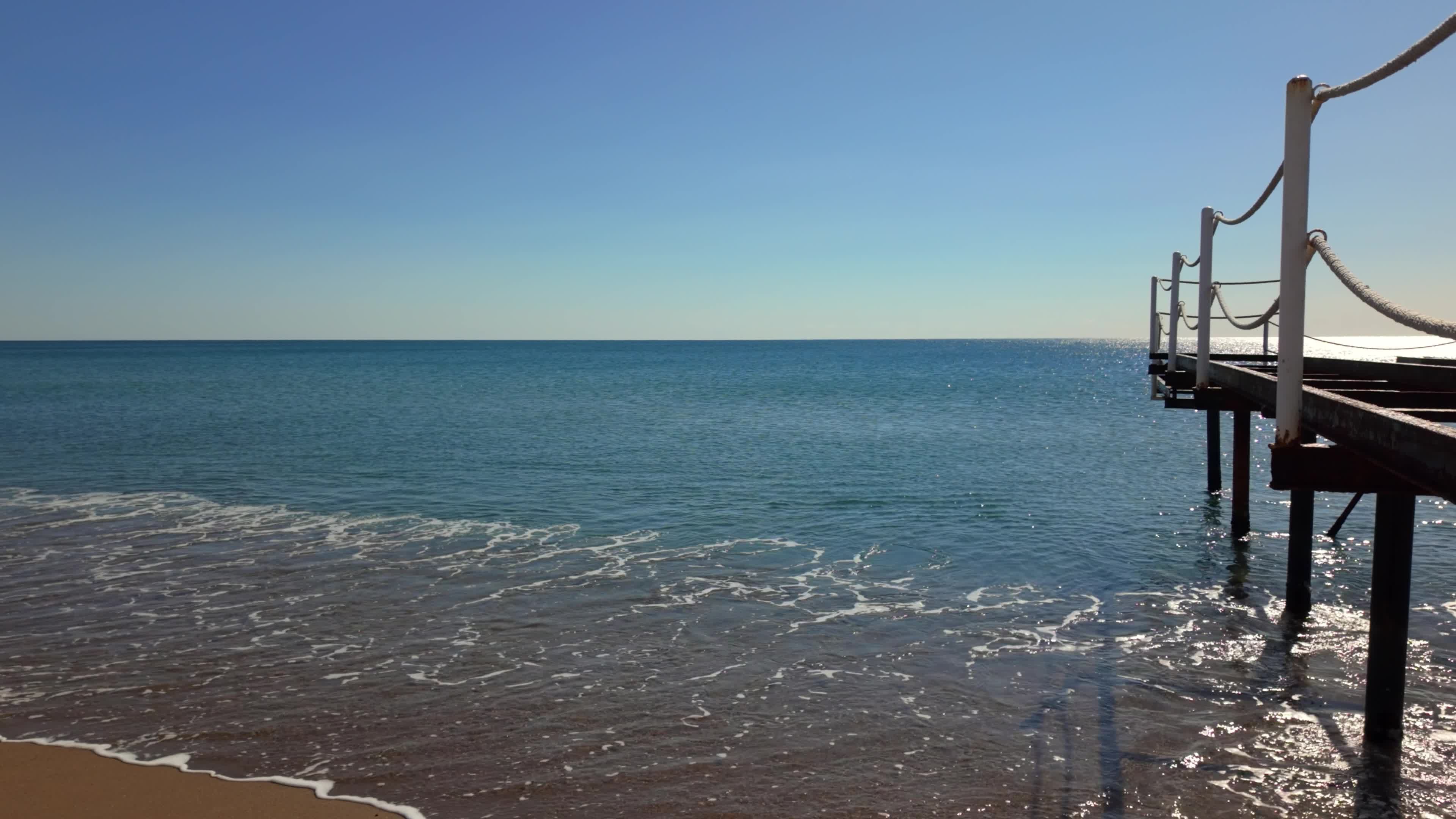 Serene Ocean View with Sunny Pier Free Stock Video Footage, Royalty ...