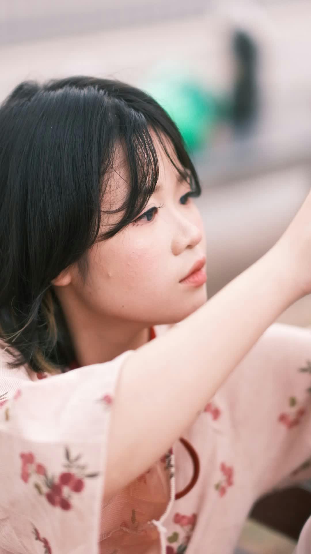 Asian Women Styling Hair in Traditional Dresses Free Stock Video ...