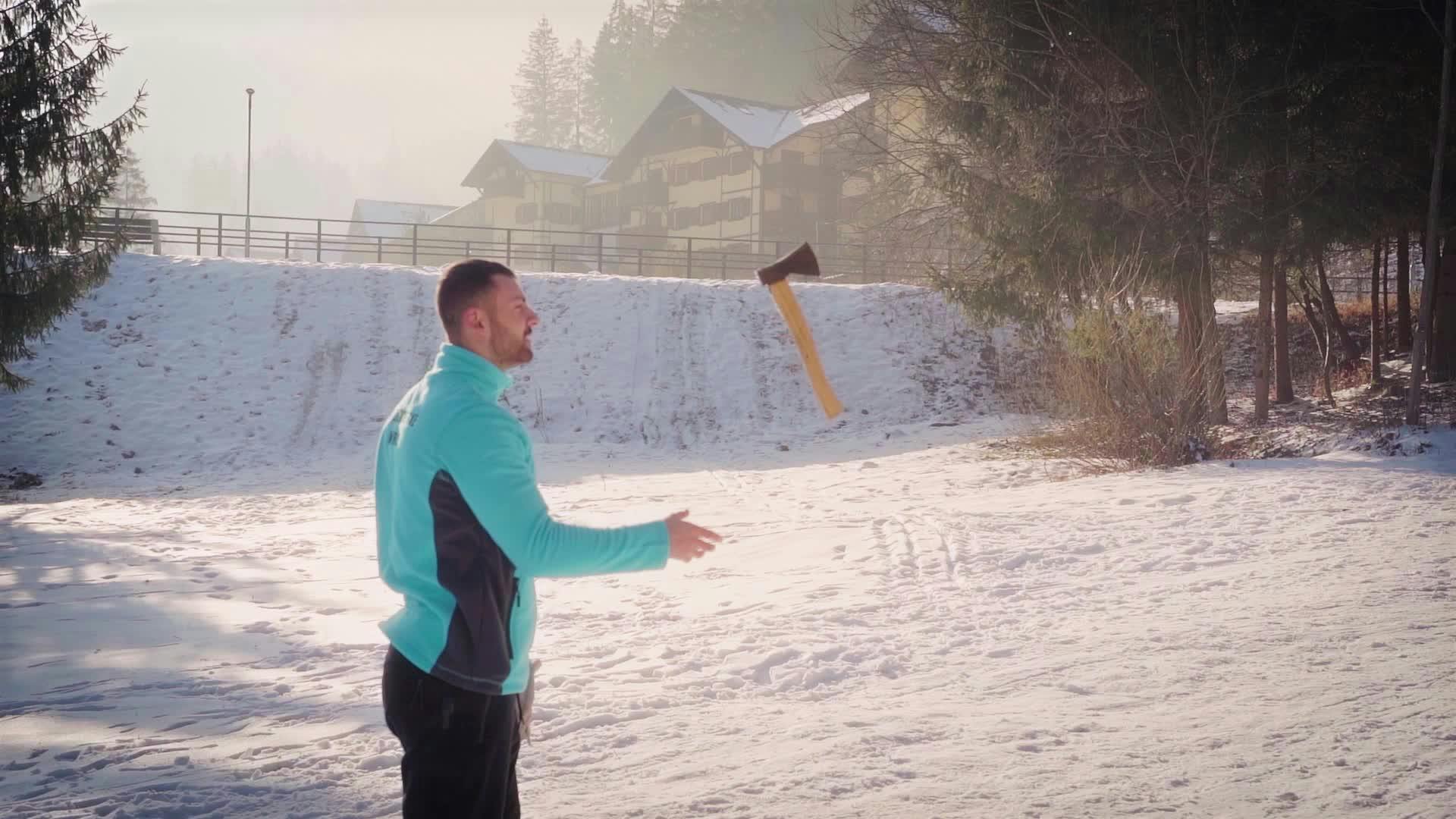 Winter Scene: Man Tossing Axe in Snowy Forest Free Stock Video Footage ...
