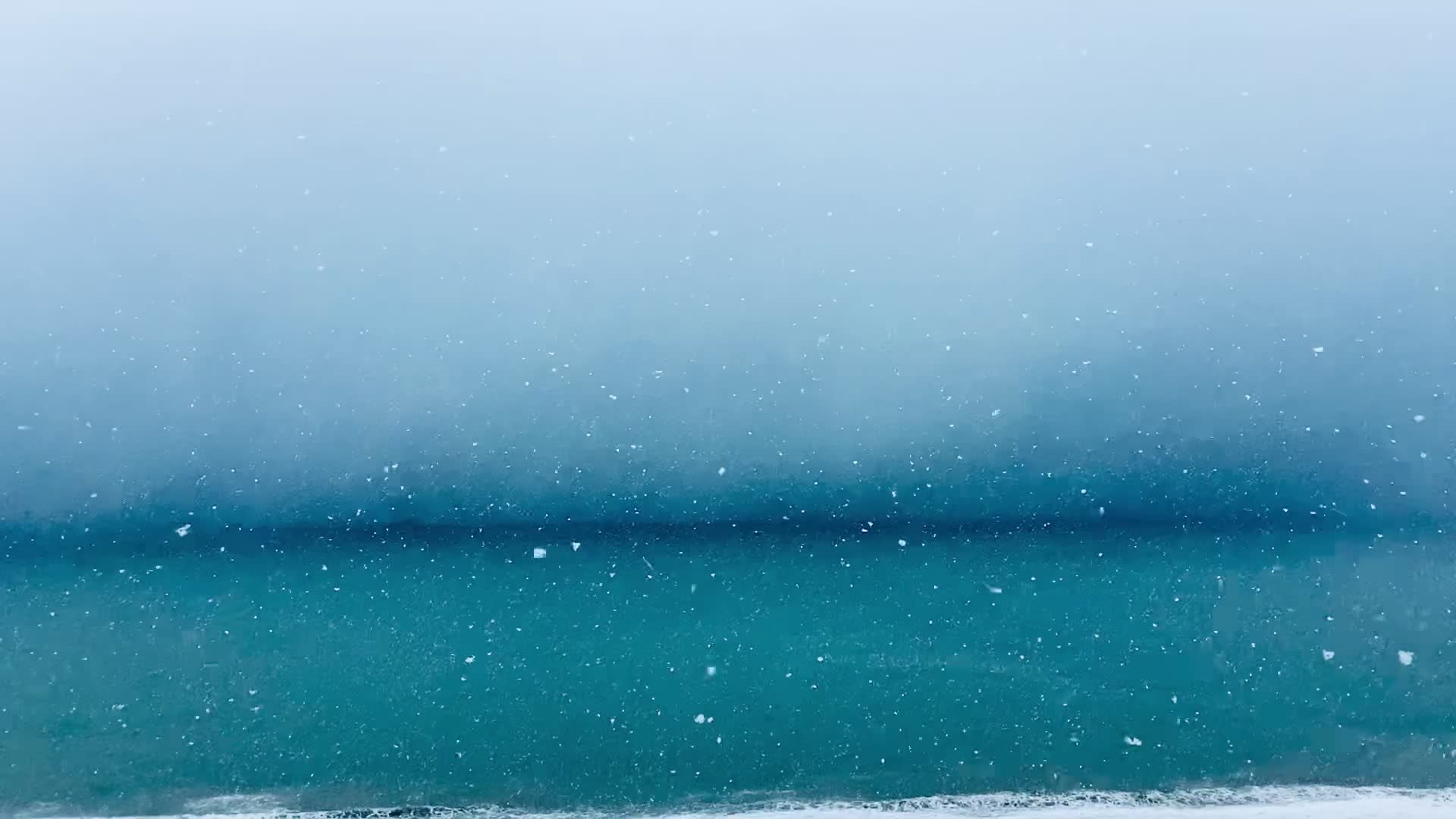 Calm Winter Sea with Falling Snowflakes Free Stock Video Footage ...