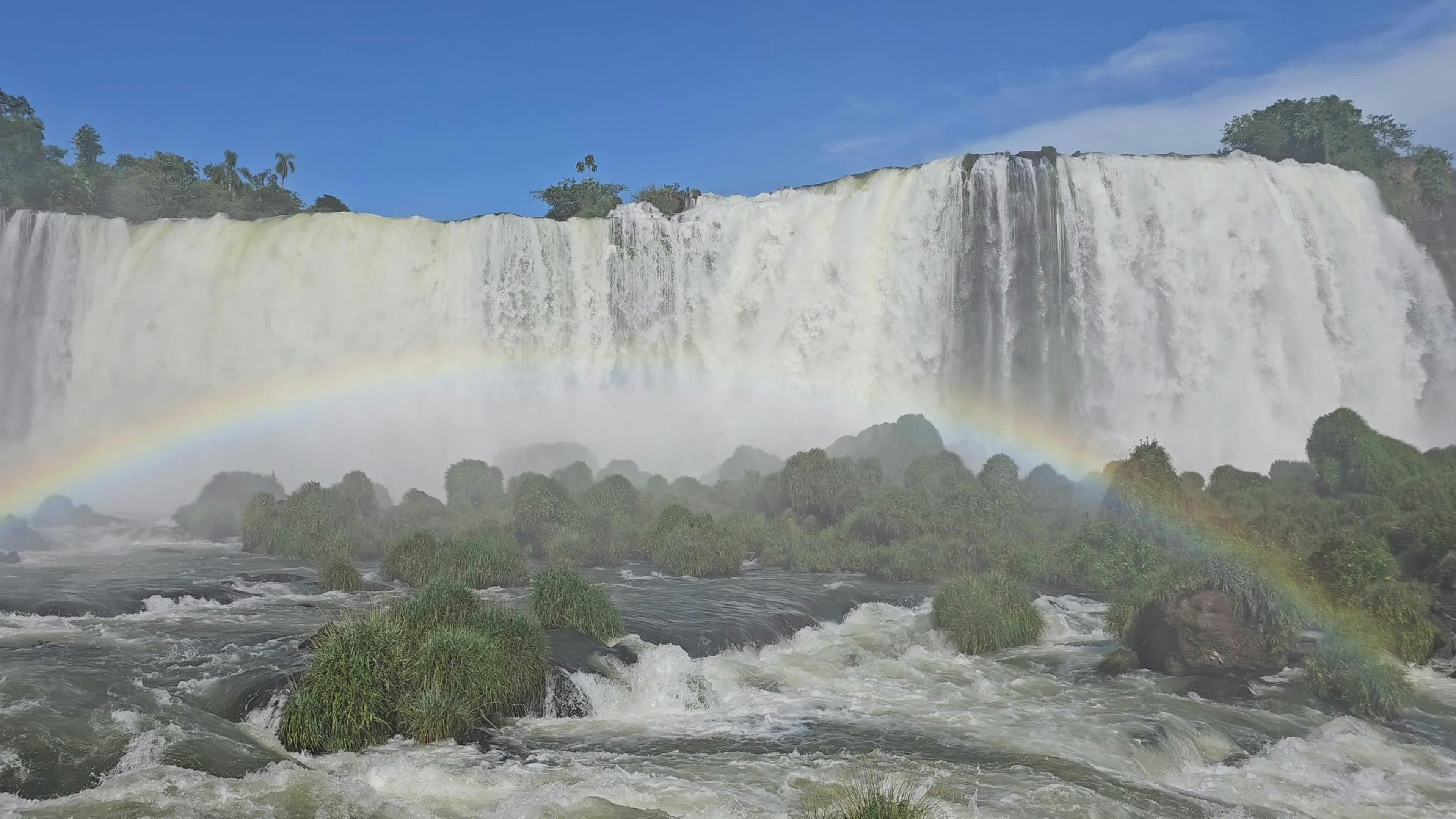 Backside Of A Woman Watching The Waterfalls Free Stock Video Footage ...