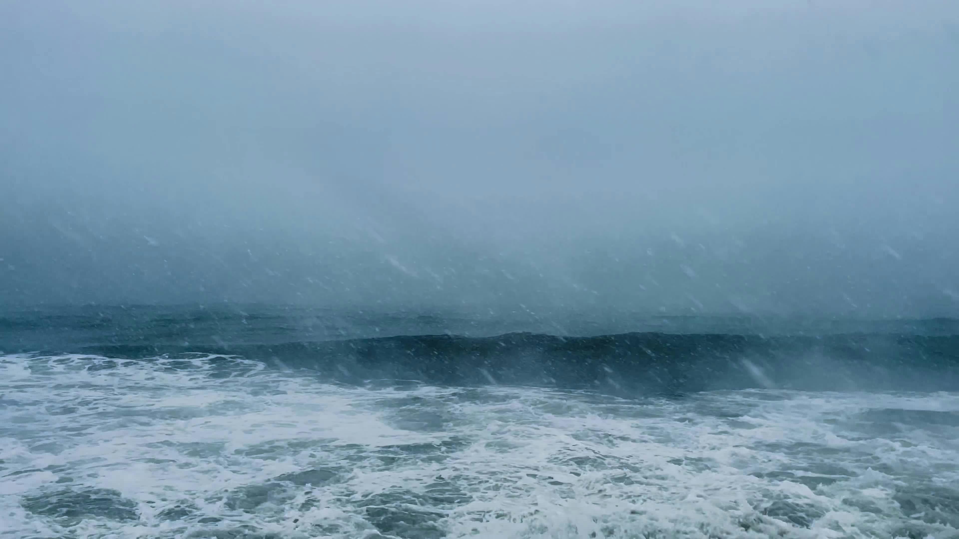 Snowfall Over Chilly Ocean Waves in Winter Free Stock Video Footage ...