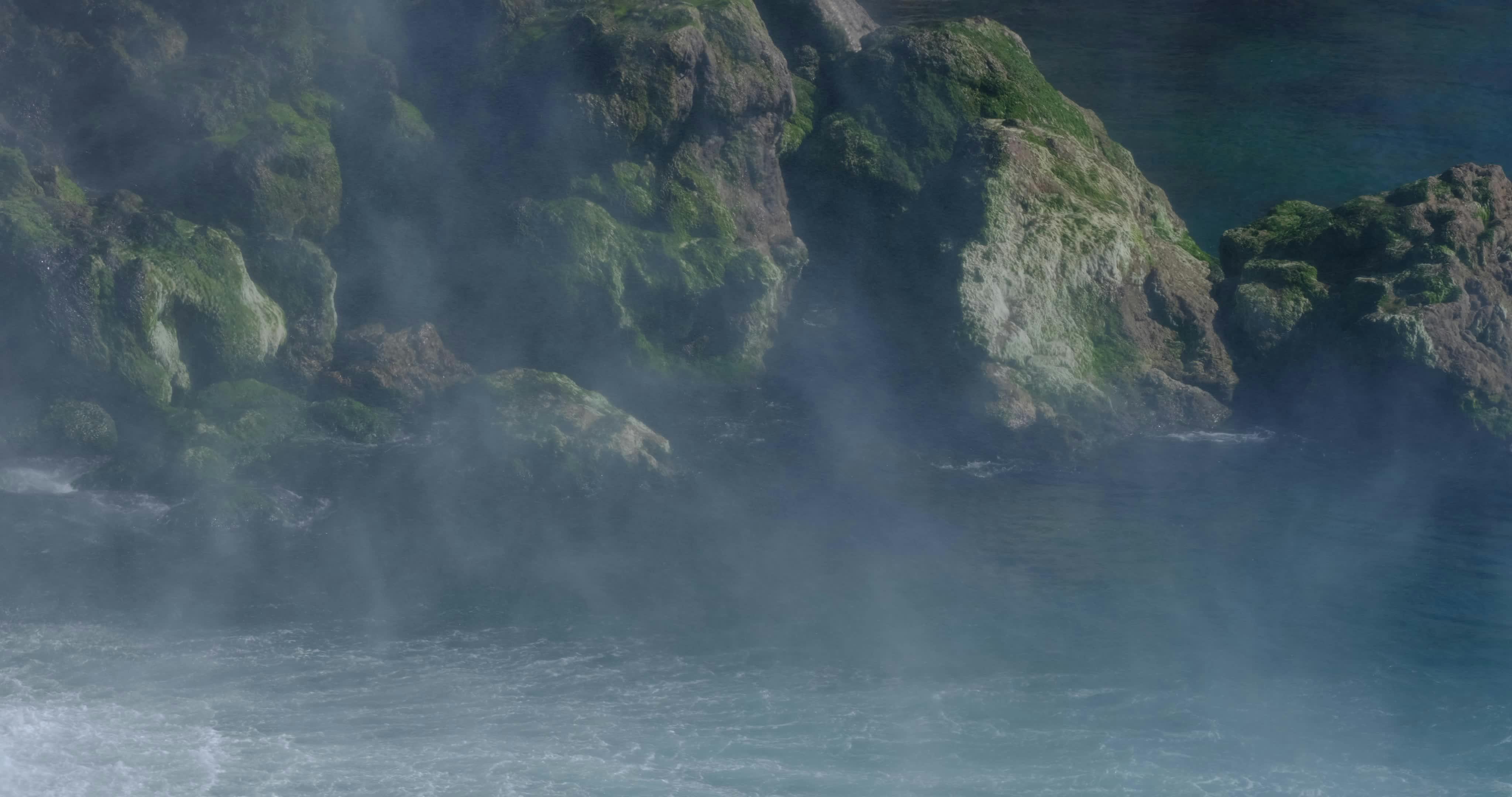 Serene Rocky Coastline with Misty Waves Free Stock Video Footage ...