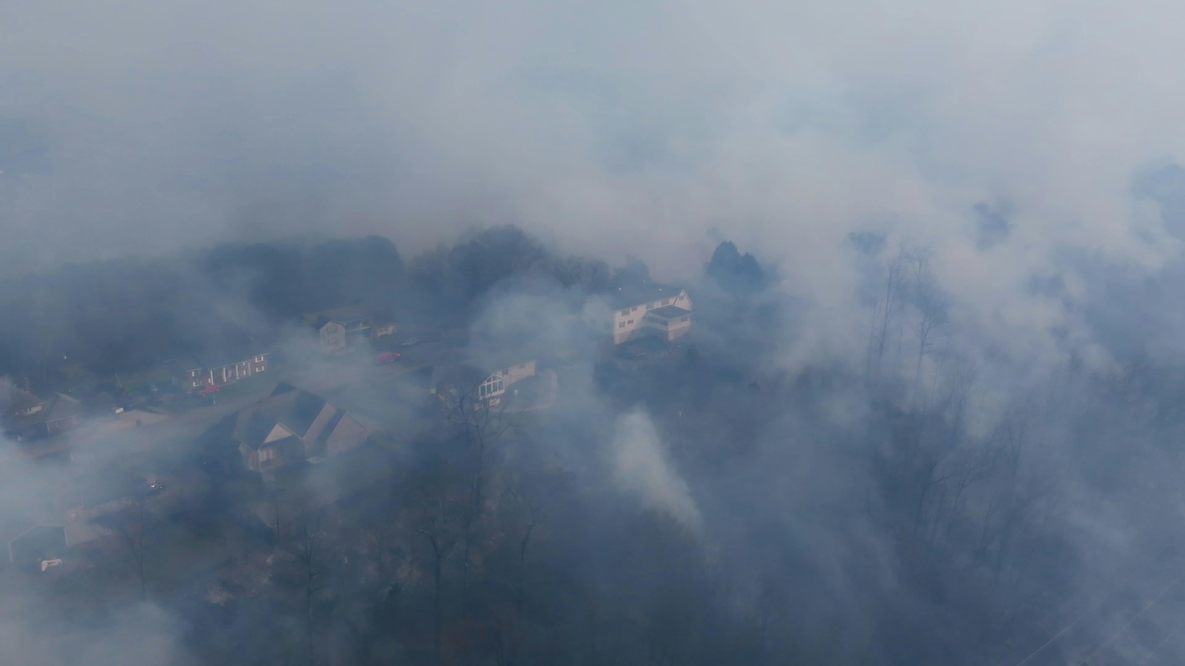 Aerial View of Smoke-Engulfed Rural Village Free Stock Video Footage ...