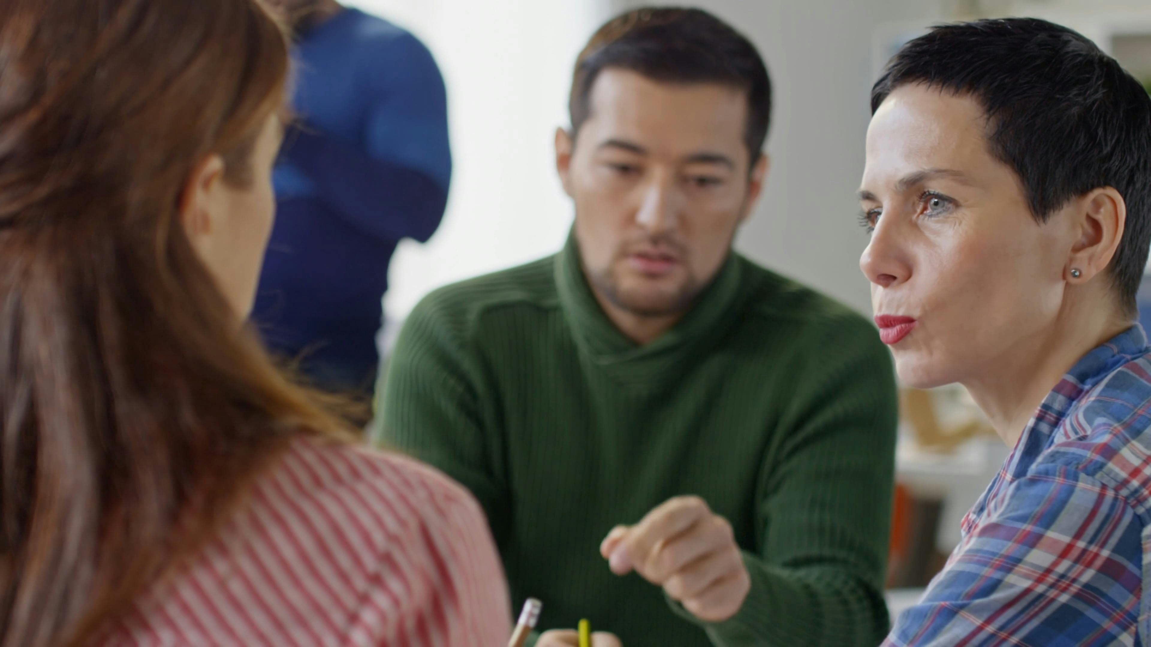 A Man Explaining A Business Point To Two Women Free Stock Video Footage ...