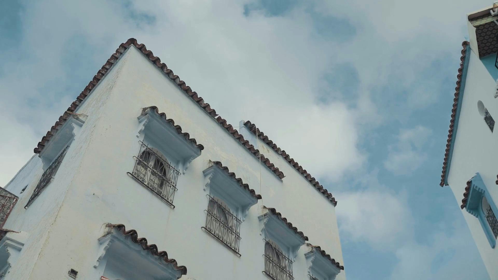 A Woman Dancing Freely Outdoors On A Concrete Pavement Free Stock Video ...