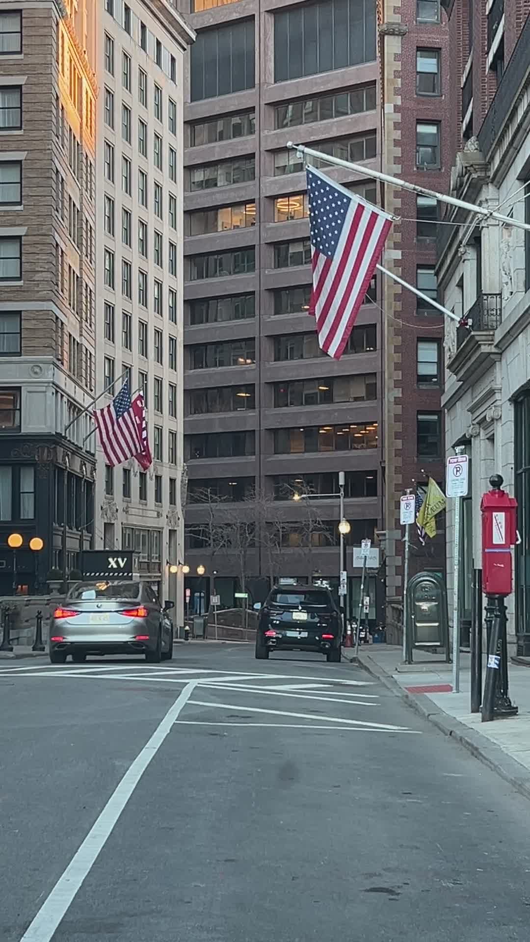 Urban Street Scene with American Flags and Cars Free Stock Video ...