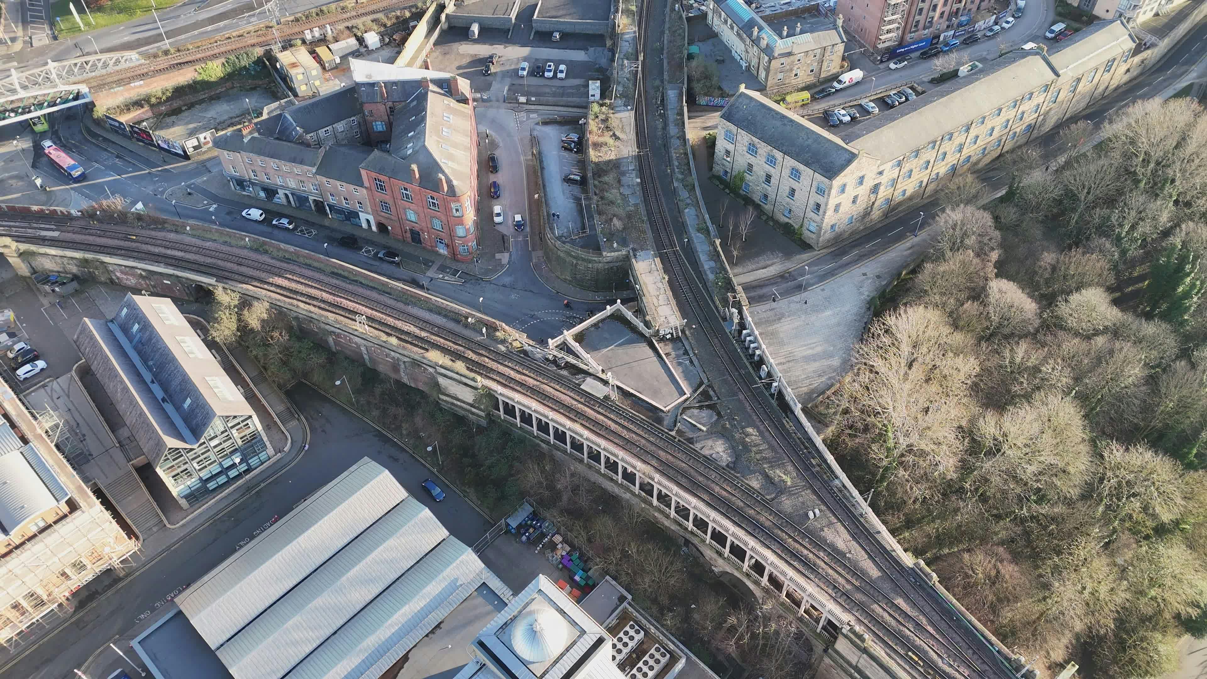 Aerial View of Urban Rail Intersection with Buildings Free Stock Video ...