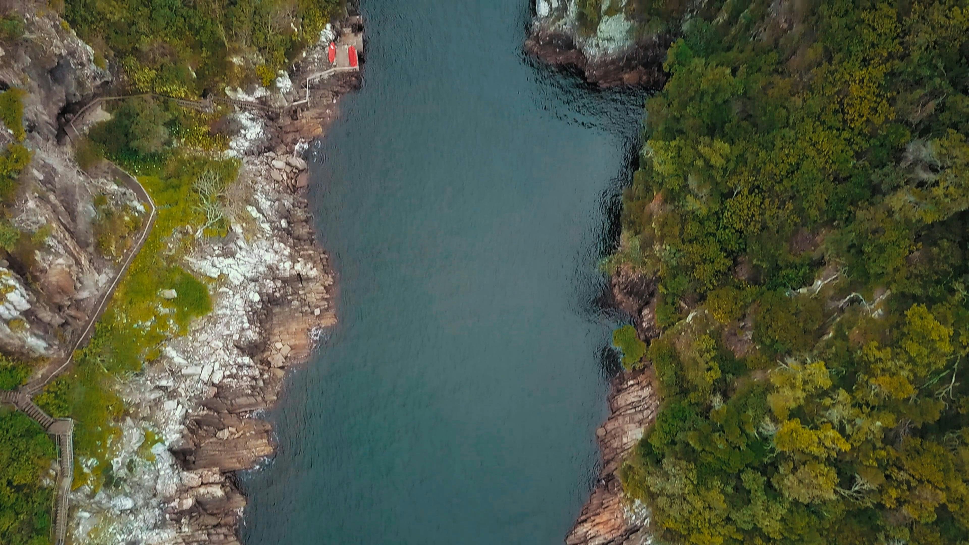 A River Cut Through The Mountains Valley · Free Stock Video