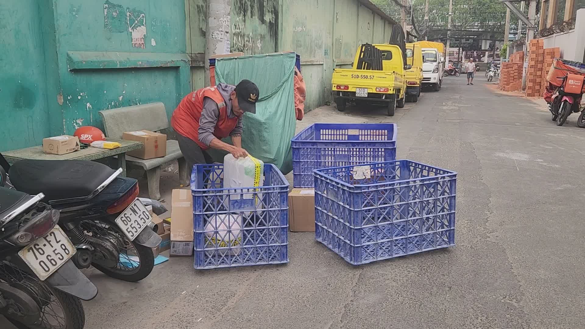 Street Delivery Worker Organizing Packages Outdoors Free Stock Video ...