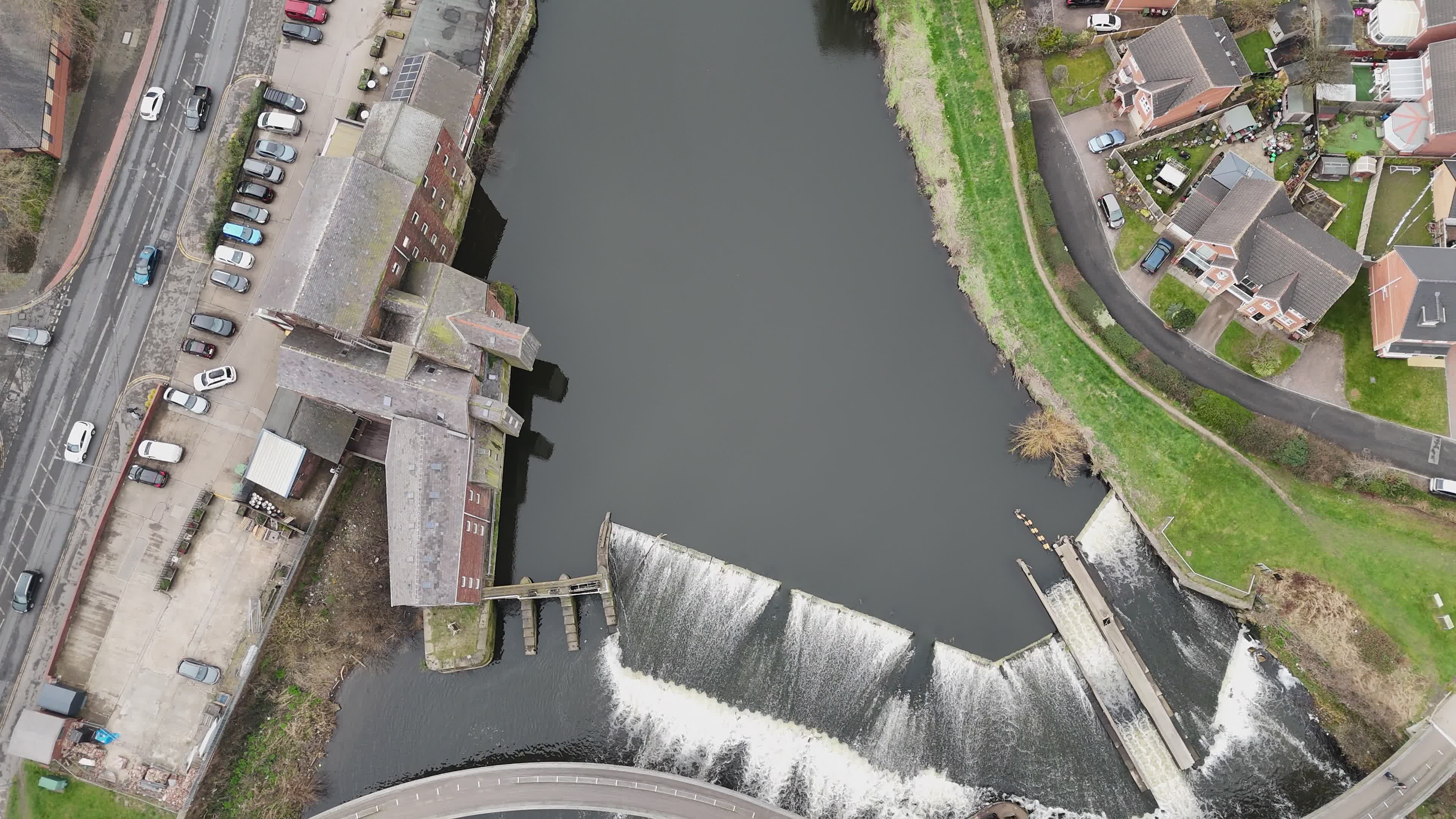 Aerial View of Riverside with Scenic Bridge Free Stock Video Footage ...