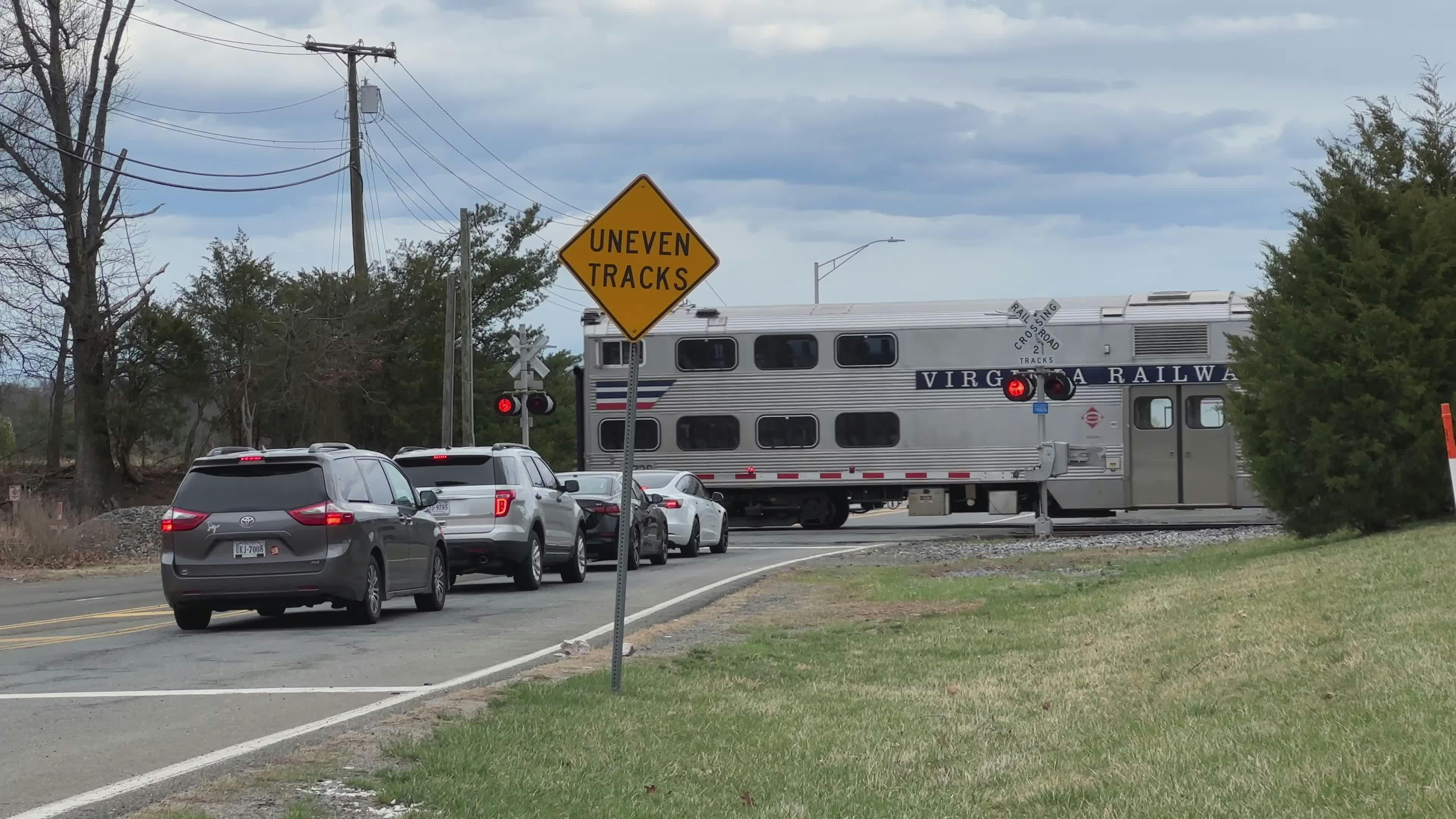 Train Passing Road Intersection in Rural Setting Free Stock Video ...