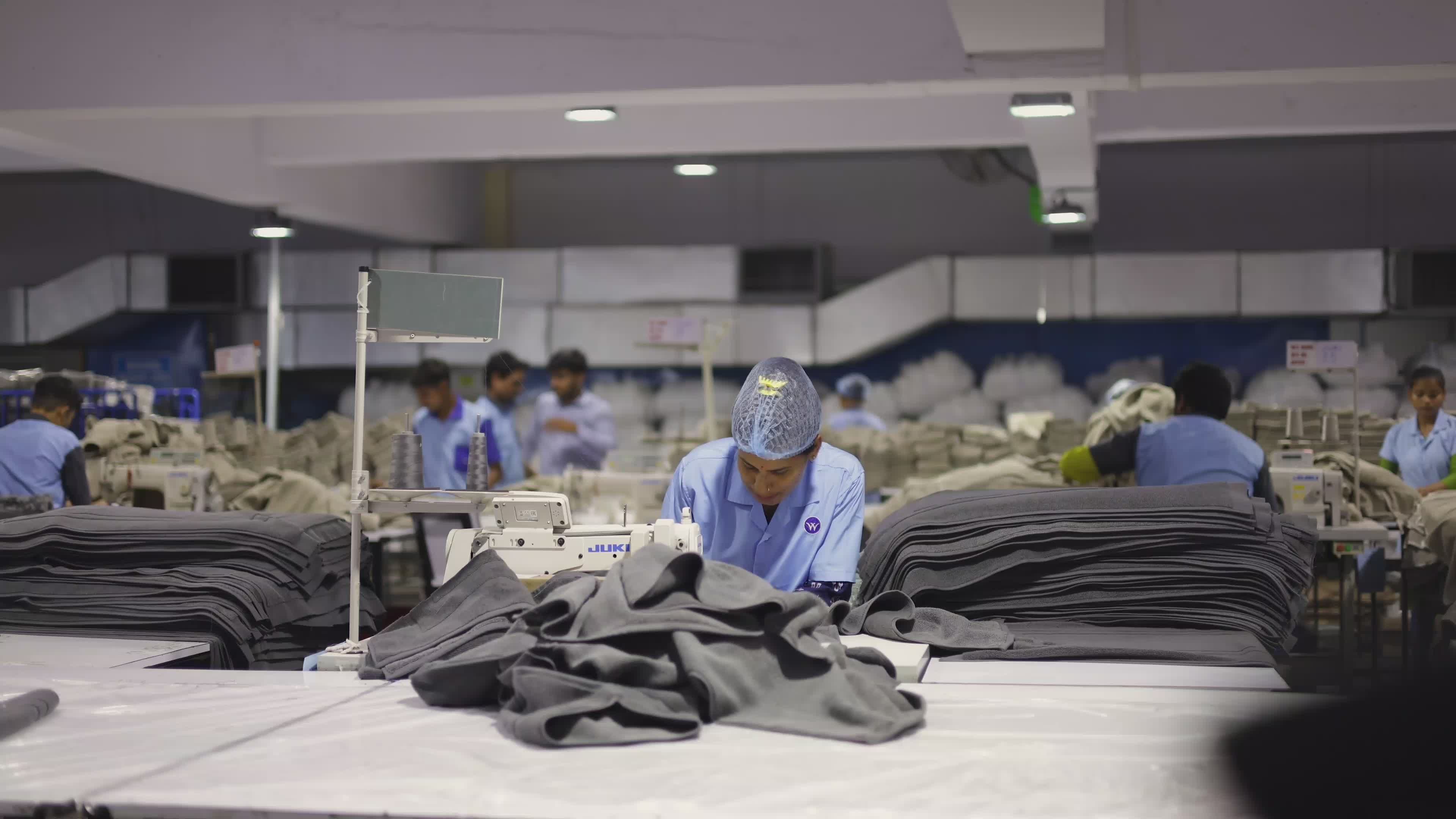 Indian Textile Workers in a Factory Setting Free Stock Video Footage ...