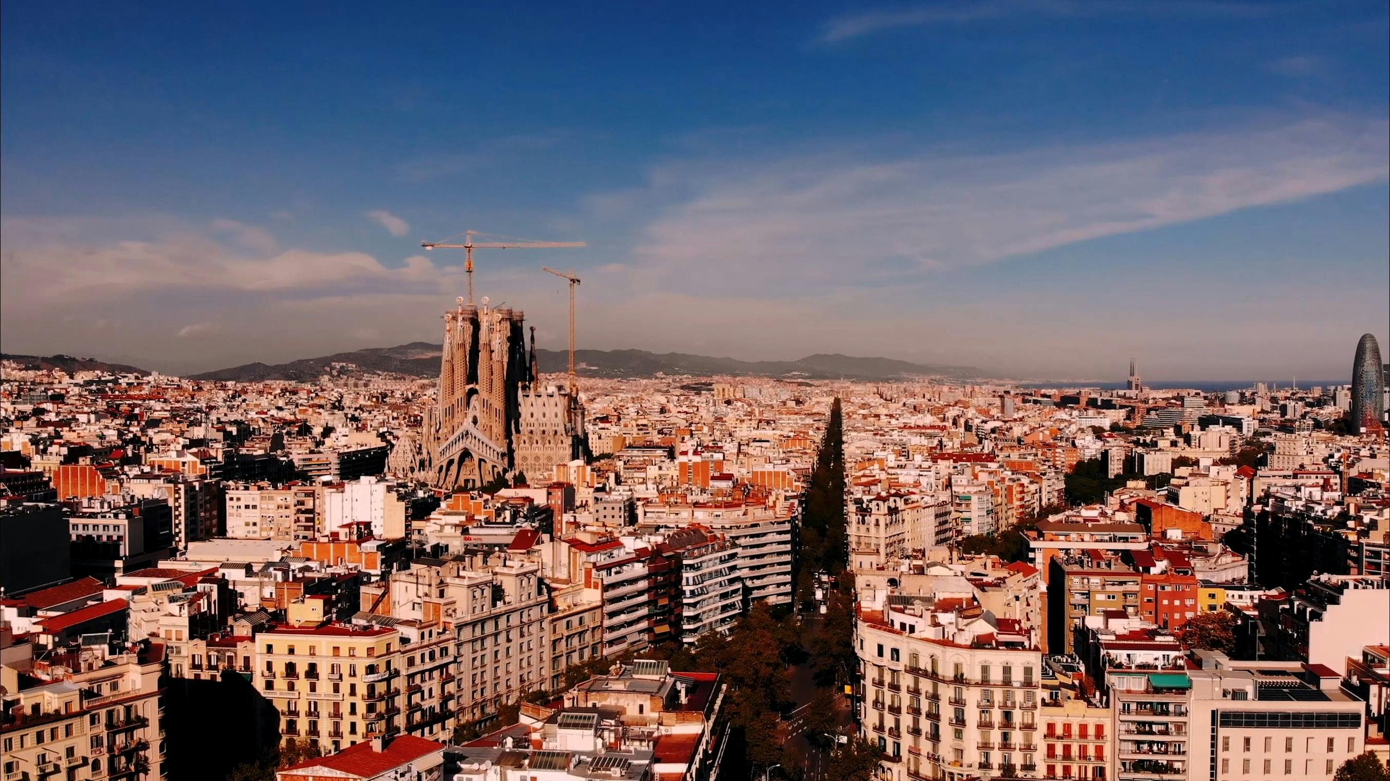 Aerial Footage Of A Skyscraper With Distinct Architectural Design Being ...