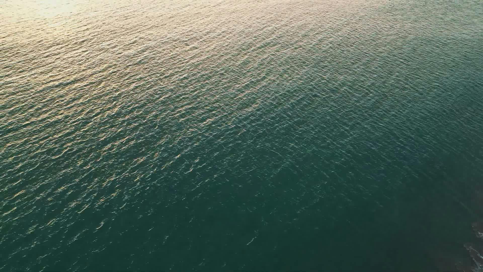 Peaceful Aerial View of Ocean Waves at Sunset Free Stock Video Footage ...
