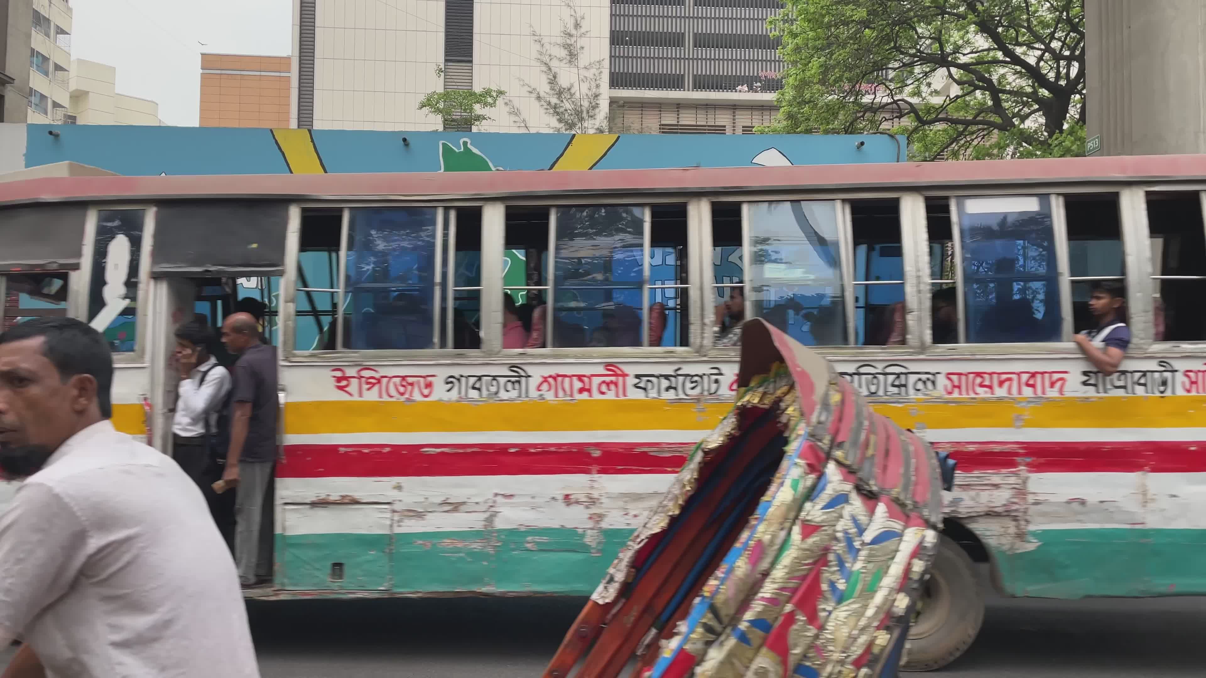 Busy Dhaka Street with Colorful Bus and Mural Free Stock Video Footage ...