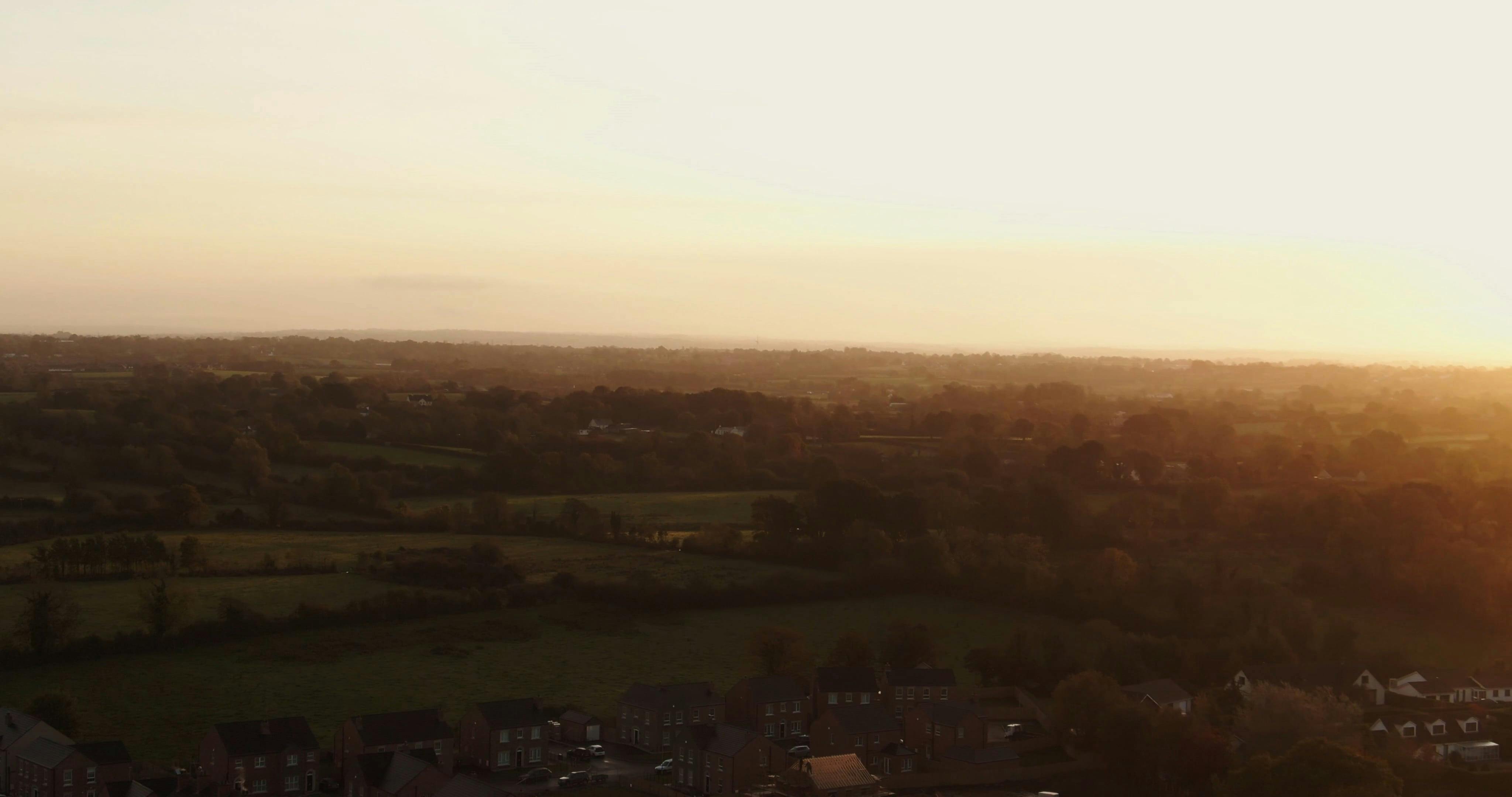 Aerial View Of A Landscape At Dawn · Free Stock Video