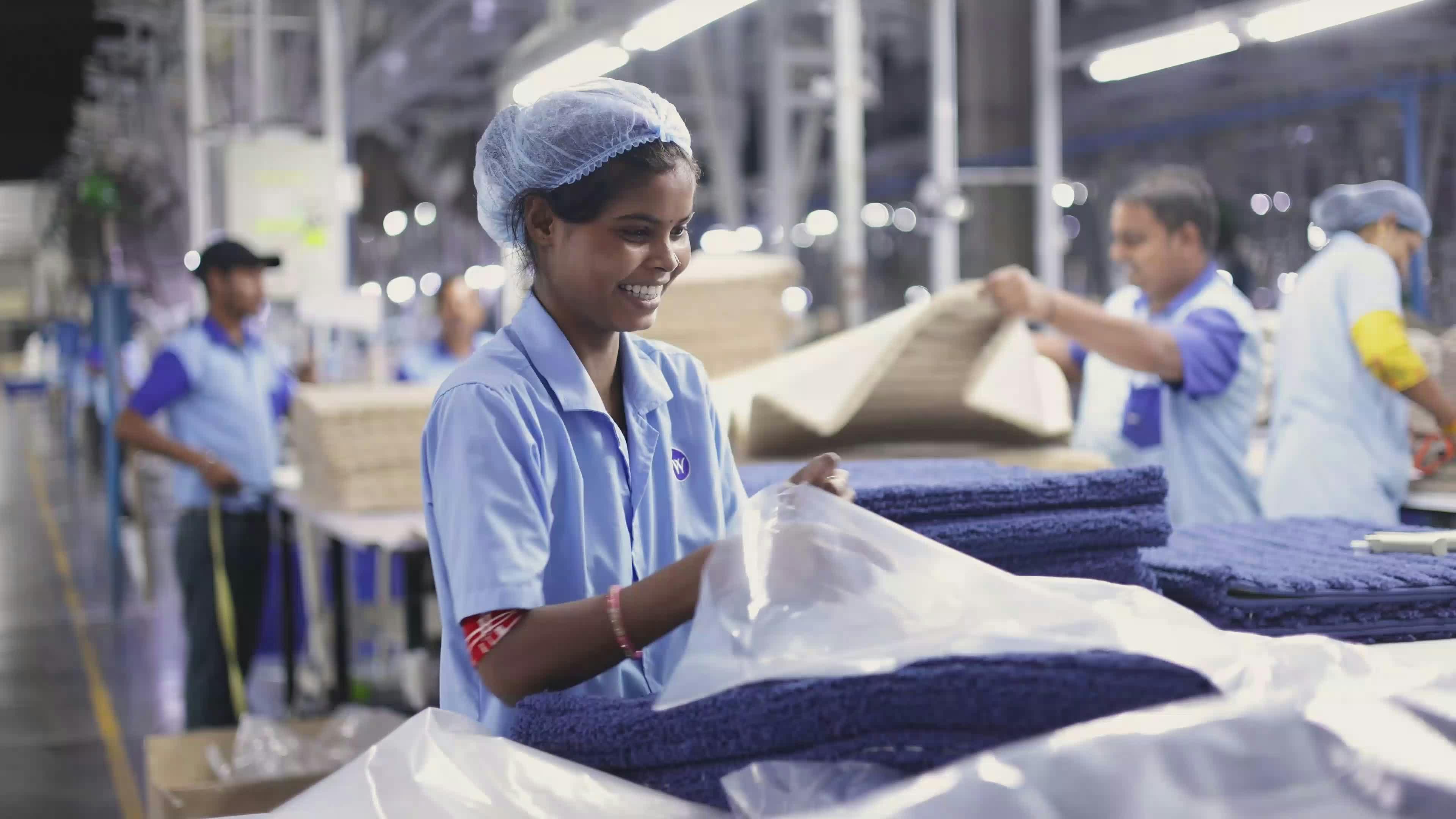 Indian Textile Factory Worker Arranging Fabrics Free Stock Video ...