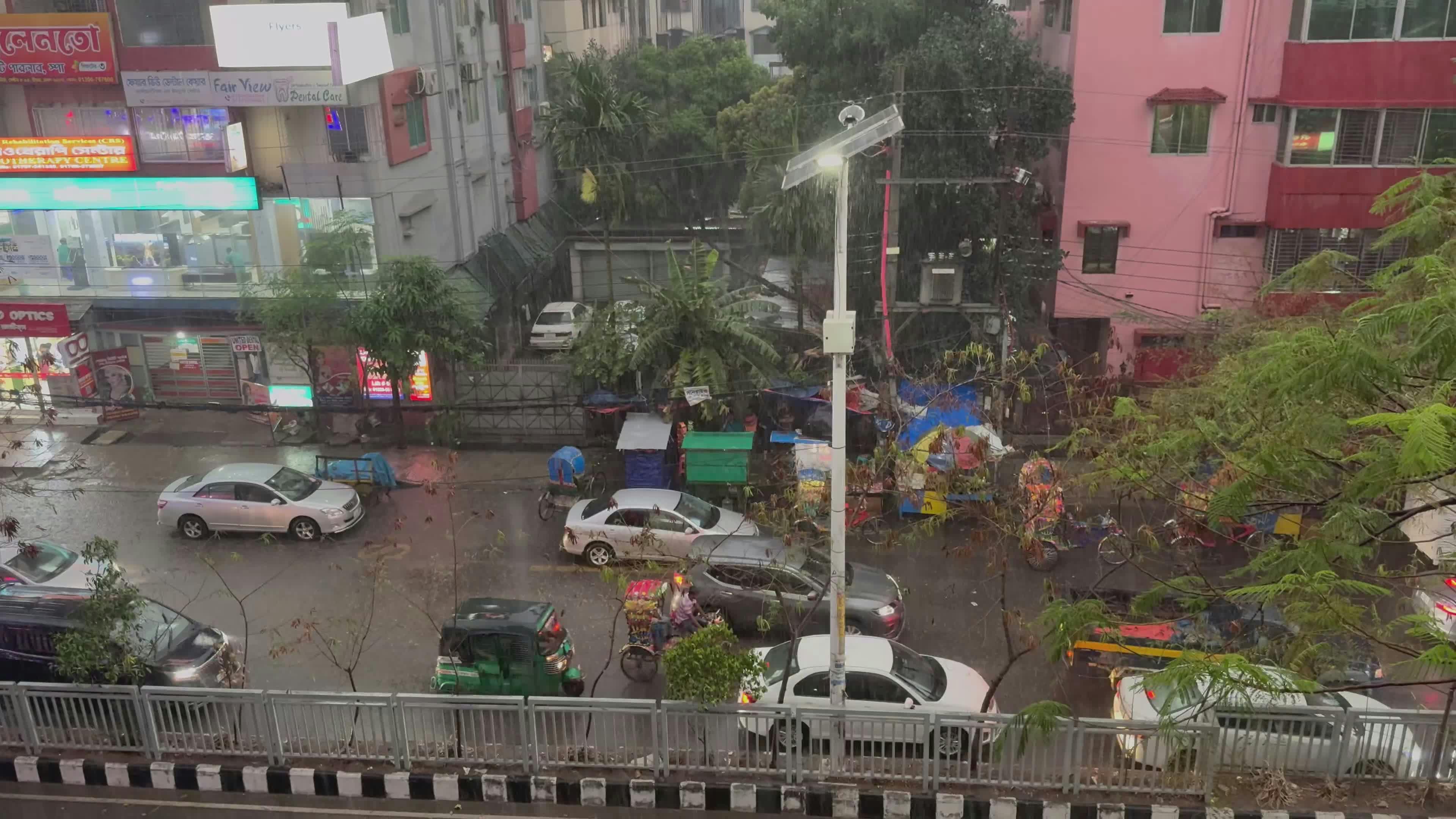 Busy City Street in Rain - Urban Monsoon Scene Free Stock Video Footage ...