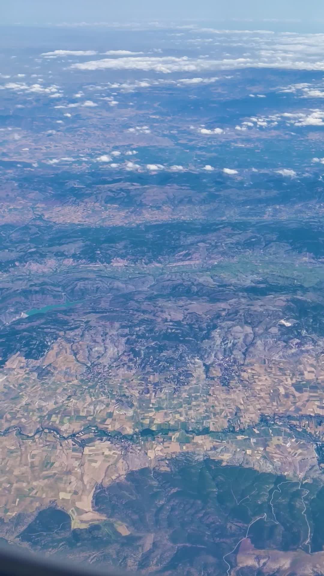 Aerial View of Rugged Terrain from an Airplane Free Stock Video Footage ...