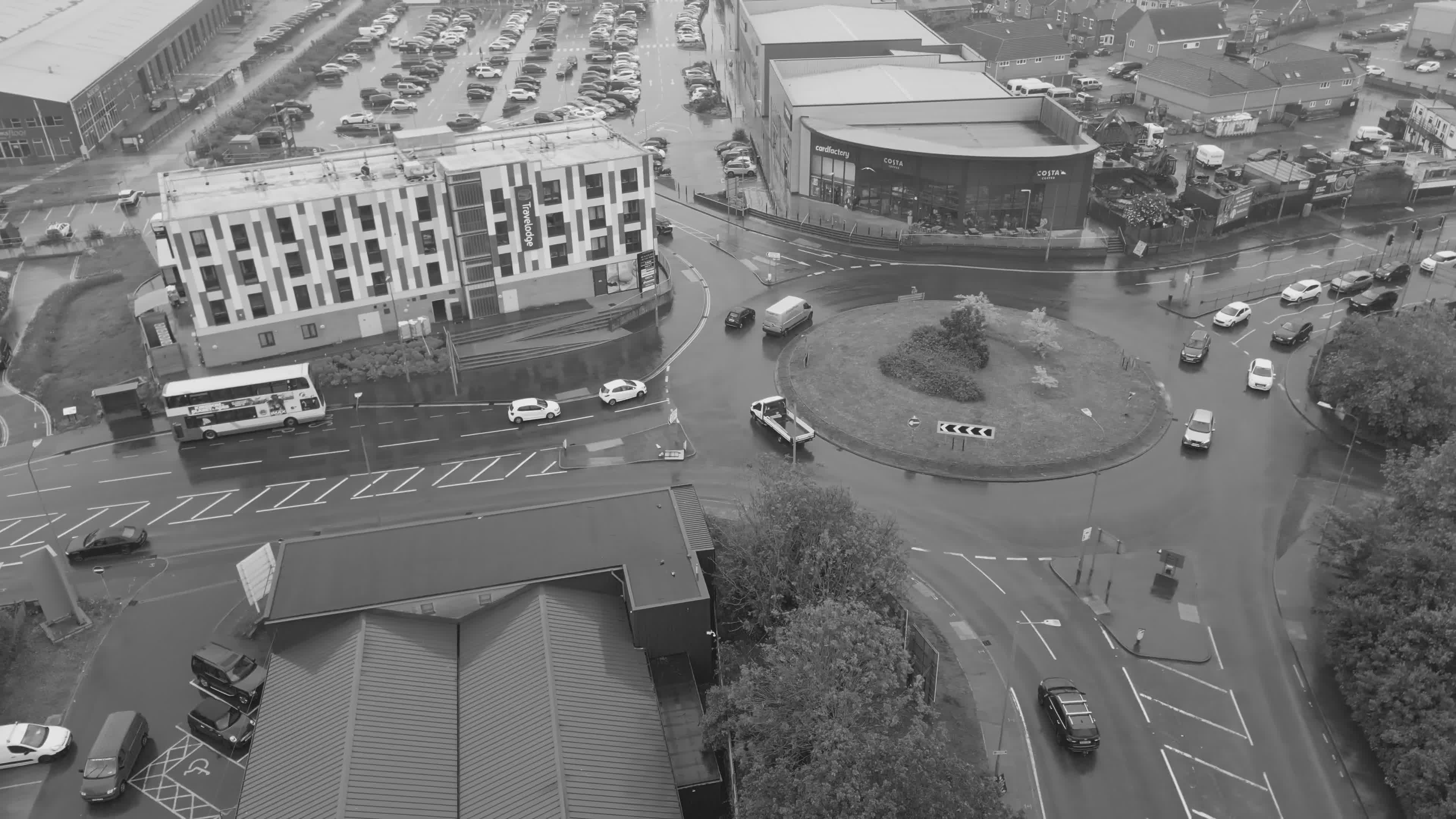 Aerial View of Busy Urban Roundabout Traffic Free Stock Video Footage ...