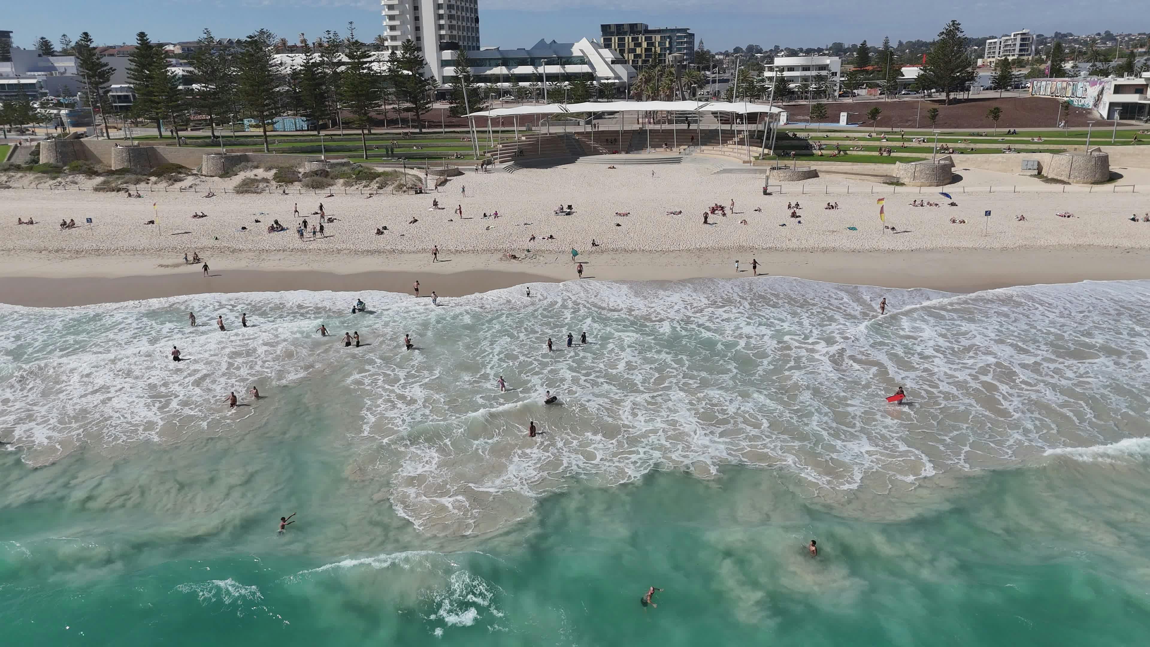 Aerial View of Busy Beach Scene in Vibrant Sunlight Free Stock Video ...