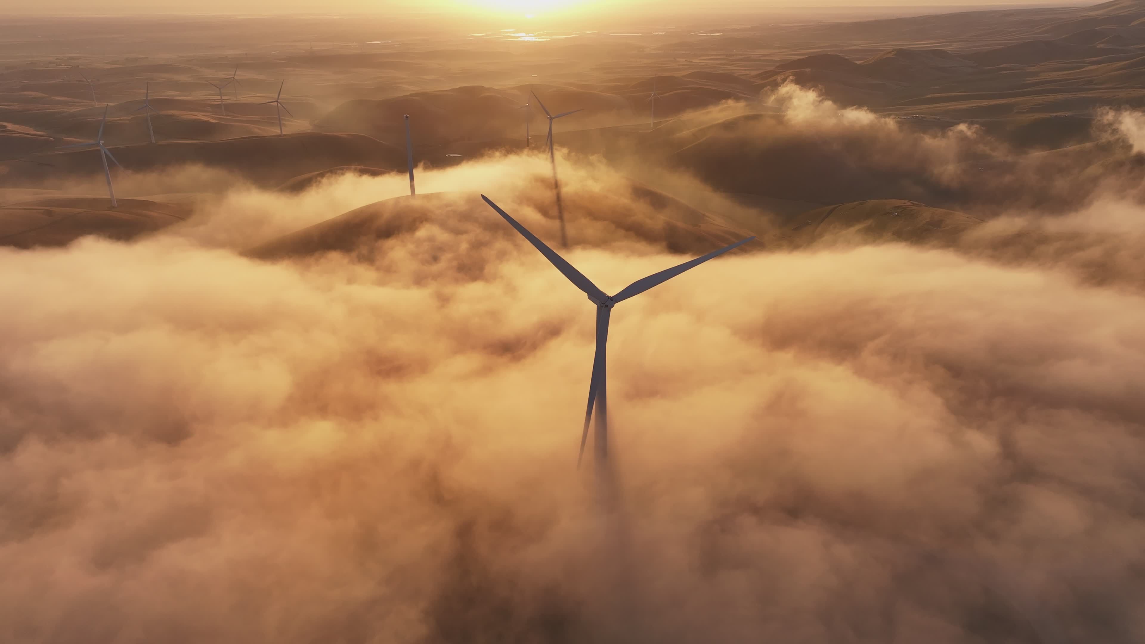 Aerial View of Wind Turbines at Sunrise in Fog Free Stock Video Footage ...