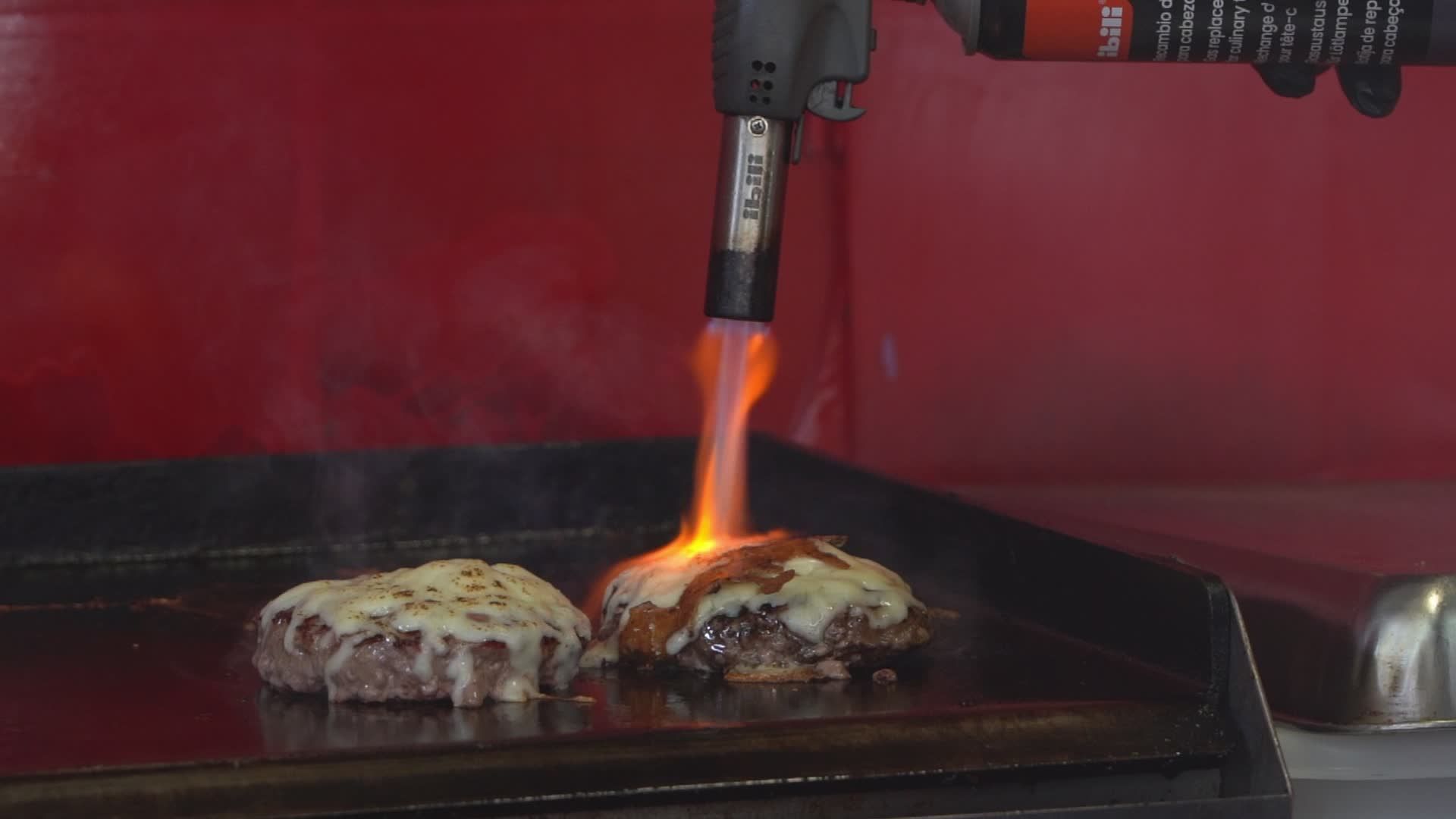Gourmet Burgers Torched on Restaurant Grill Free Stock Video Footage ...