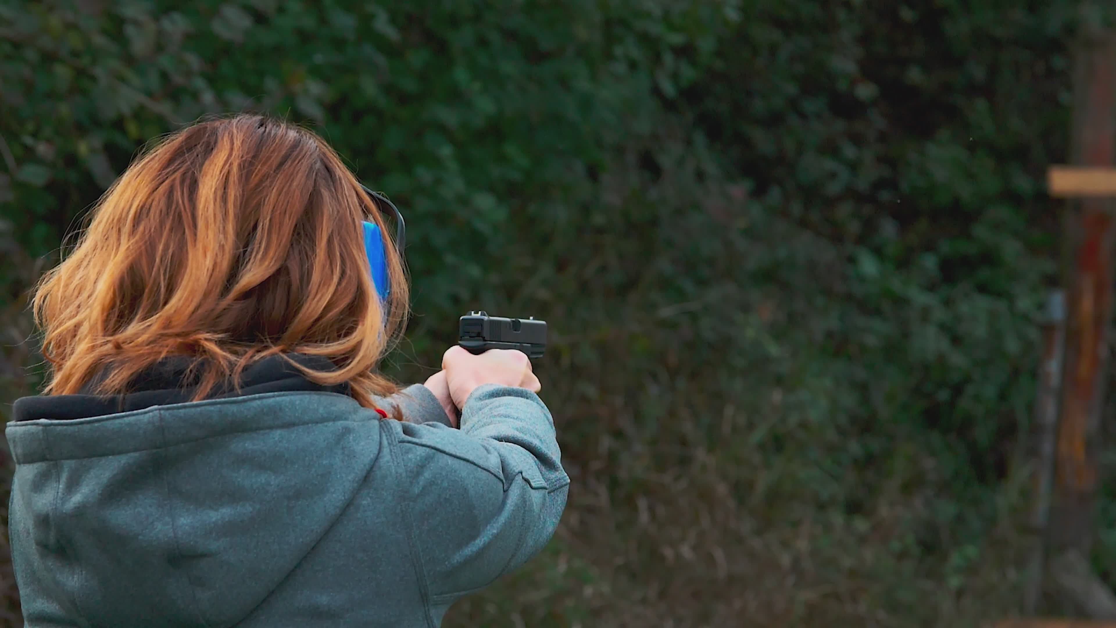 Woman Shooting Practice at Outdoor Range Free Stock Video Footage ...