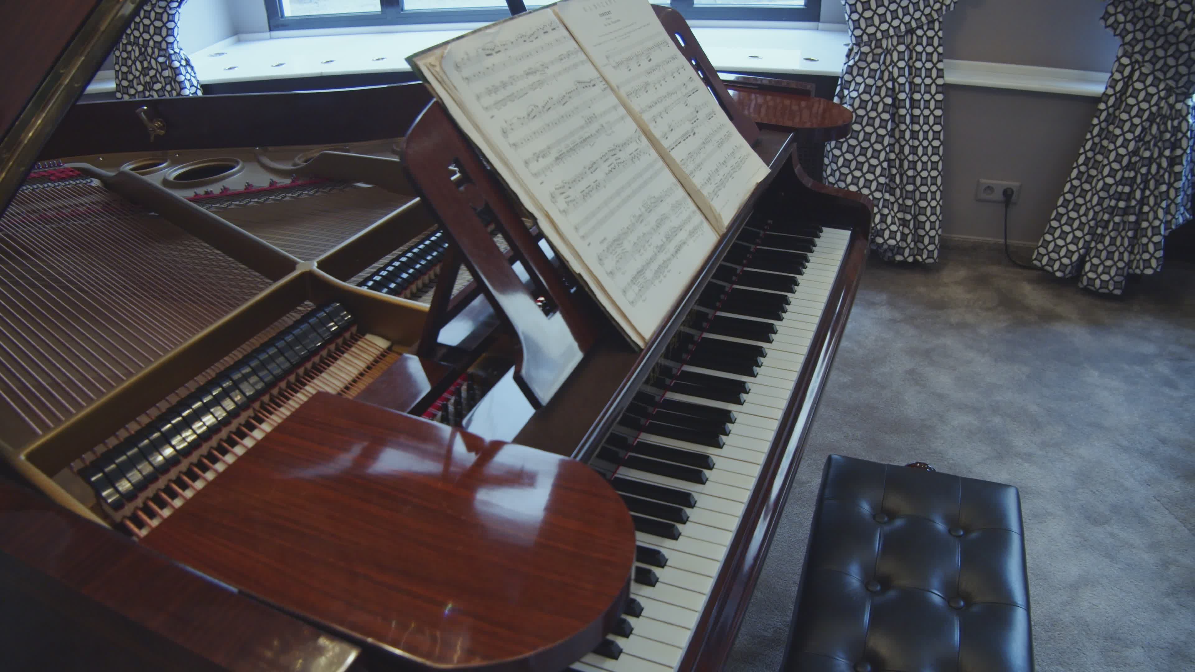 Elegant Grand Piano with Music Sheets Indoors Free Stock Video Footage ...