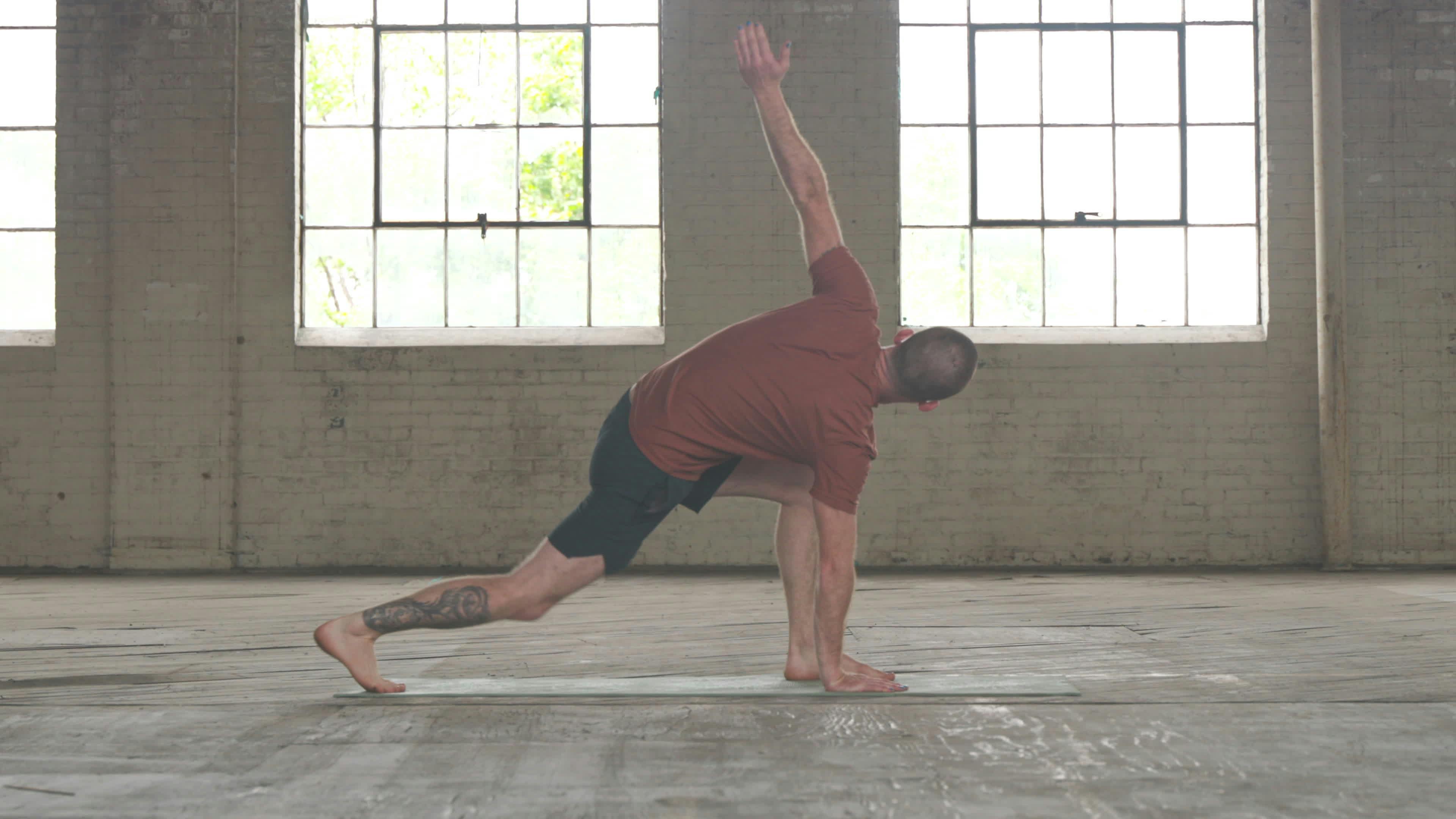 Dynamic Yoga Pose in Sunlit Urban Space Free Stock Video Footage ...