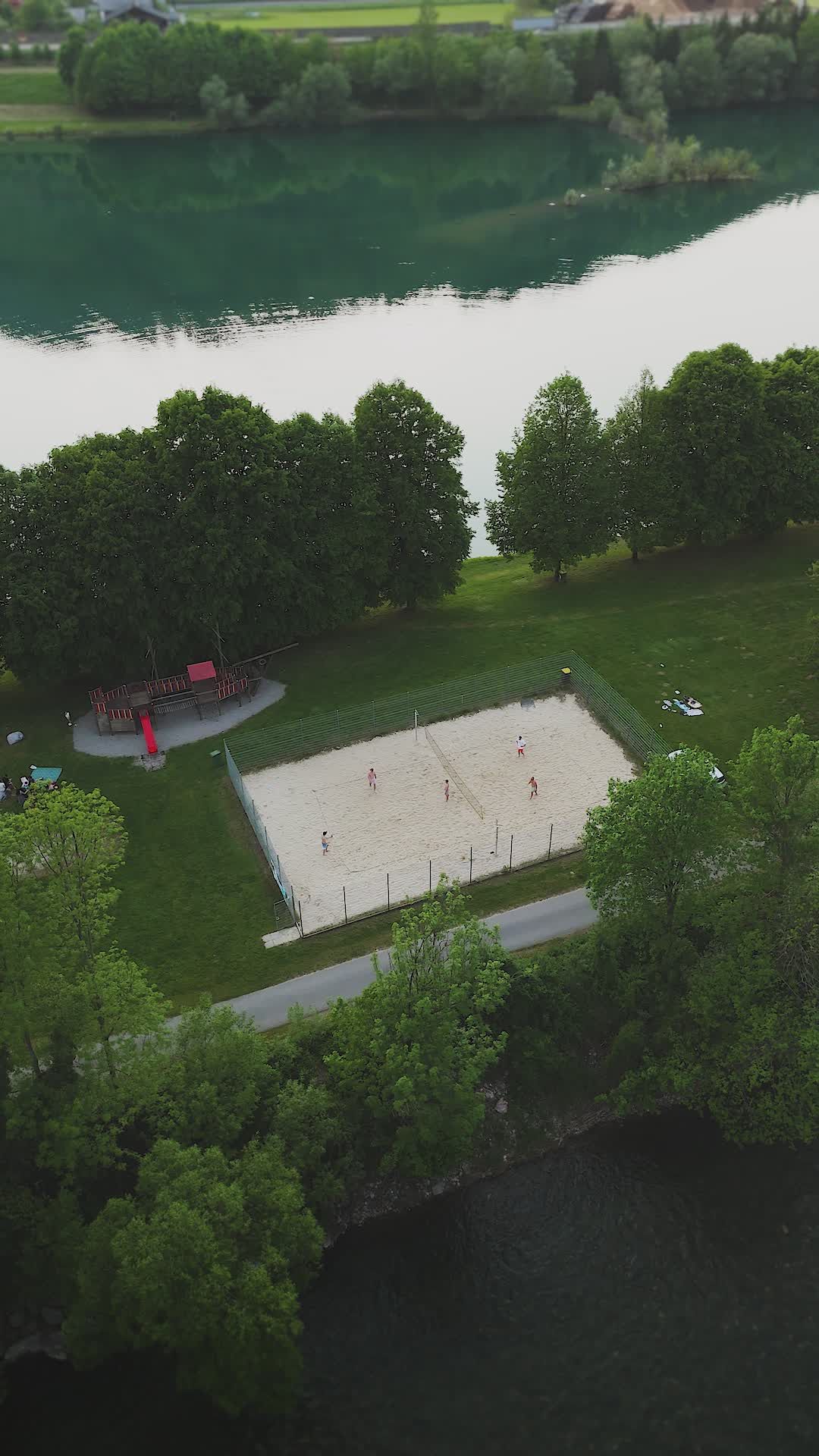 Aerial View of Outdoor Volleyball Game by a Lake Free Stock Video ...