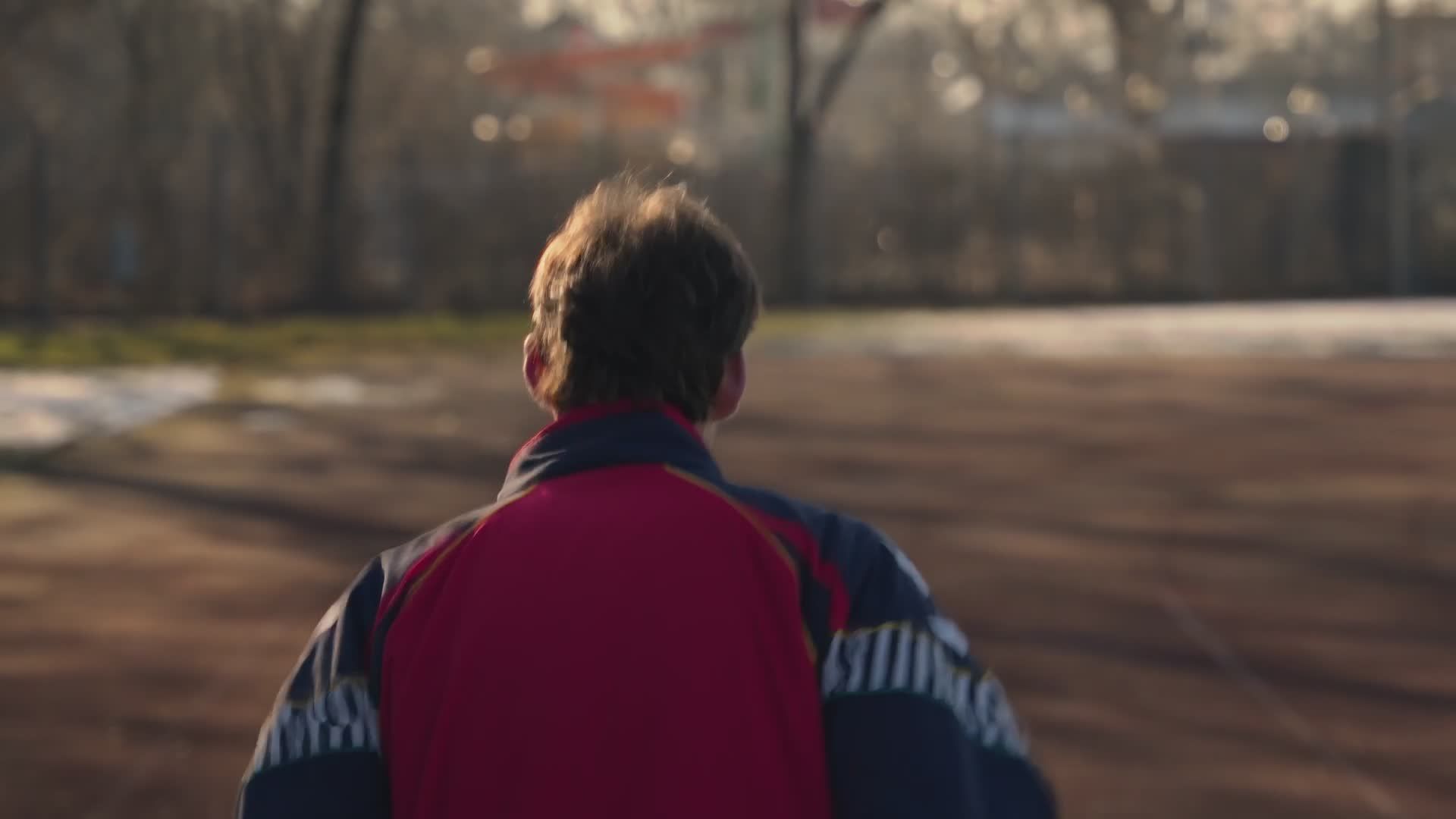 Young Athlete Running on Outdoor Track at Sunset Free Stock Video ...