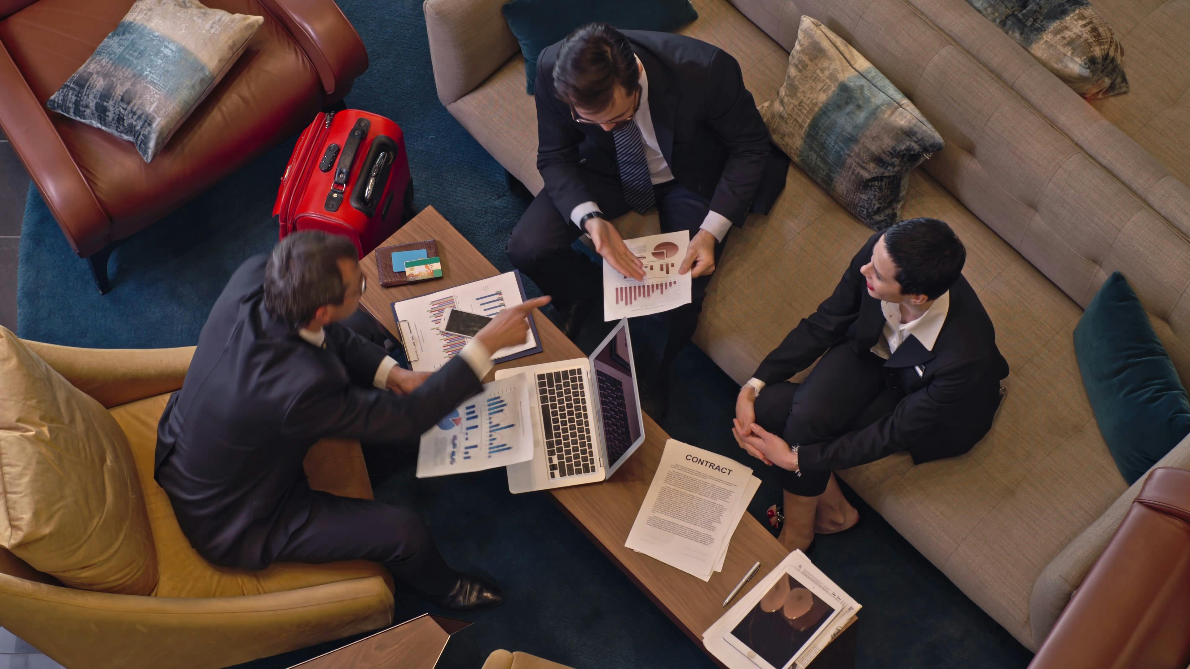 People Seated In Sofa Seats Discussing About Business Free Stock Video ...