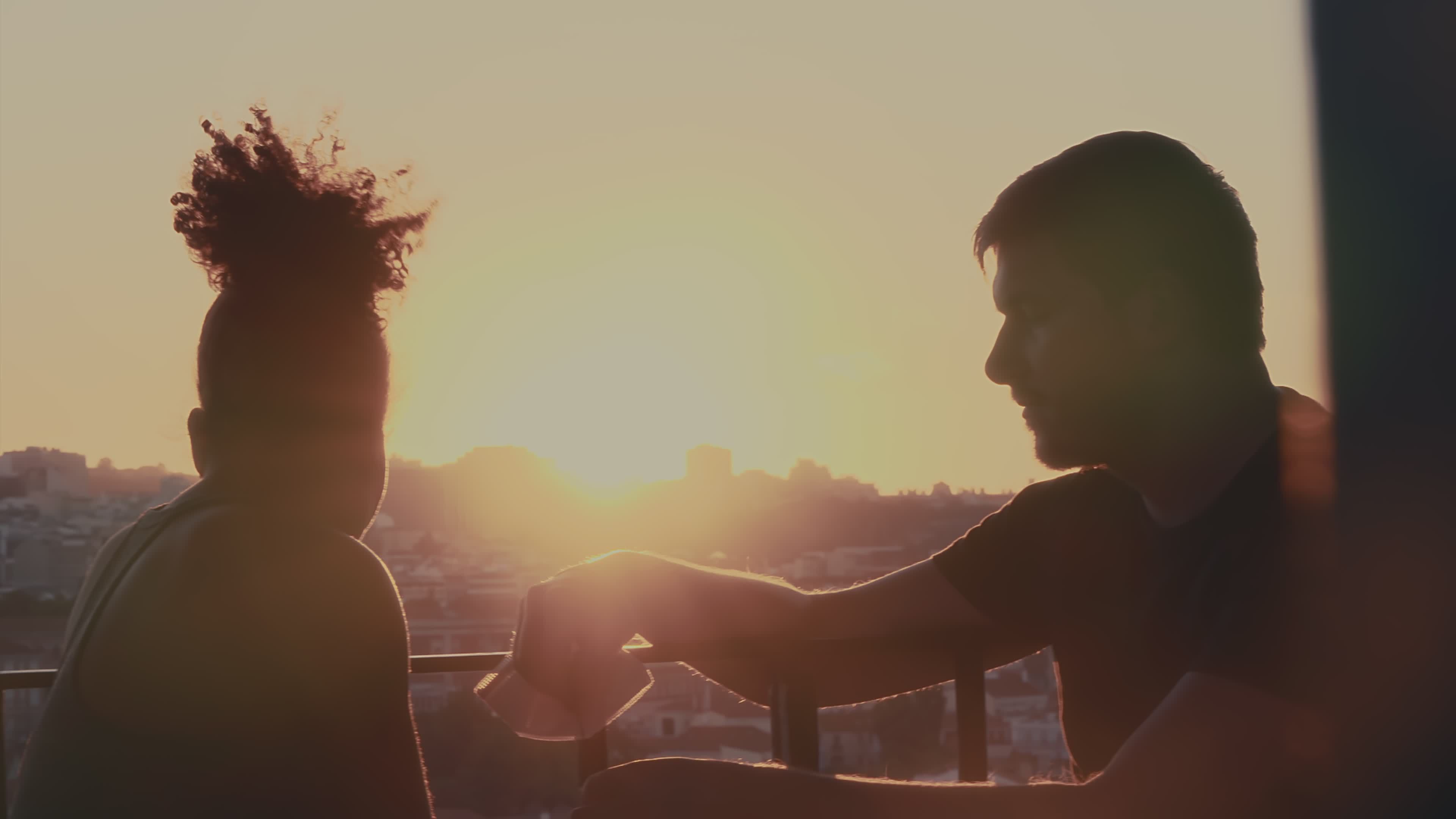 Silhouette of Two Friends Talking at Sunset Free Stock Video Footage ...
