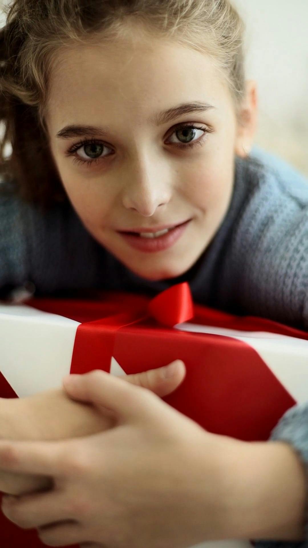 A Girl Grasping Her Box Of Present Free Stock Video Footage, Royalty ...
