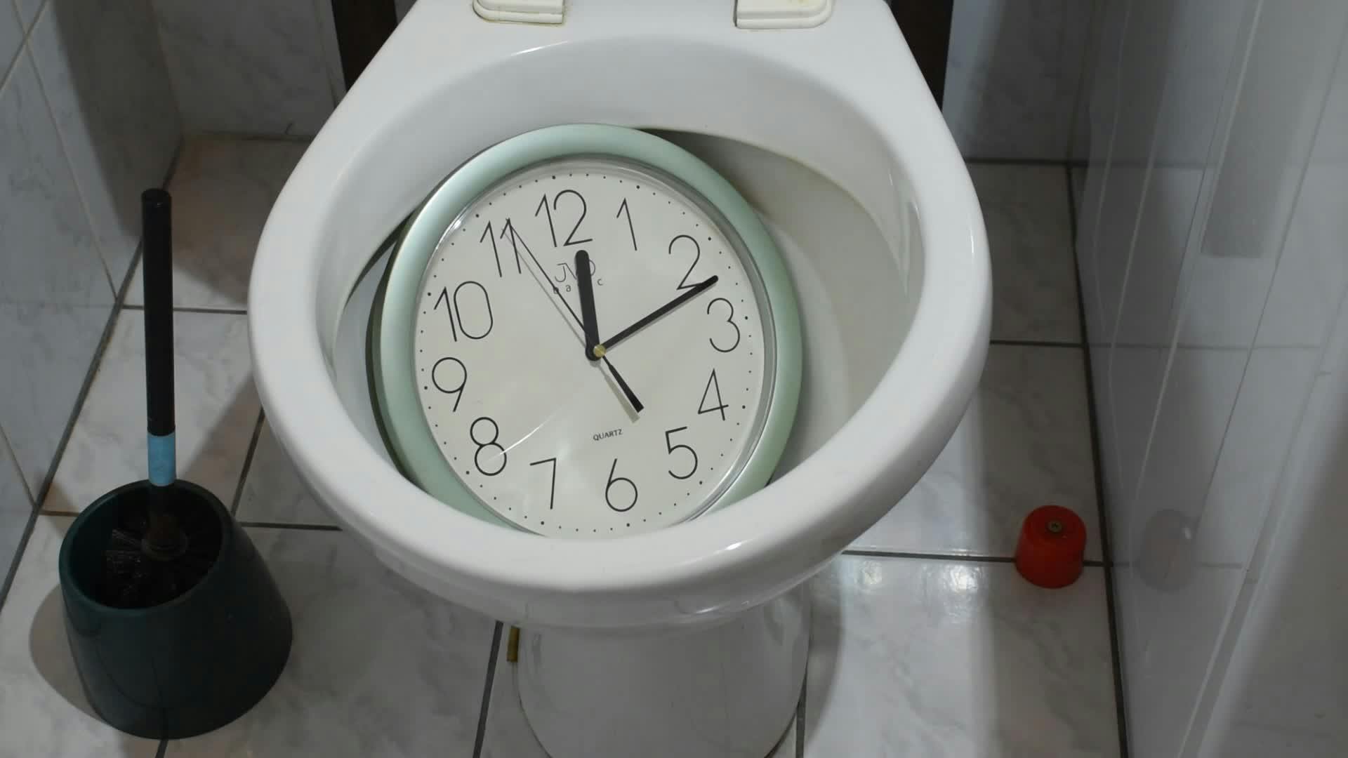 Unique Conceptual Image of Clock in Toilet Bowl Free Stock Video ...